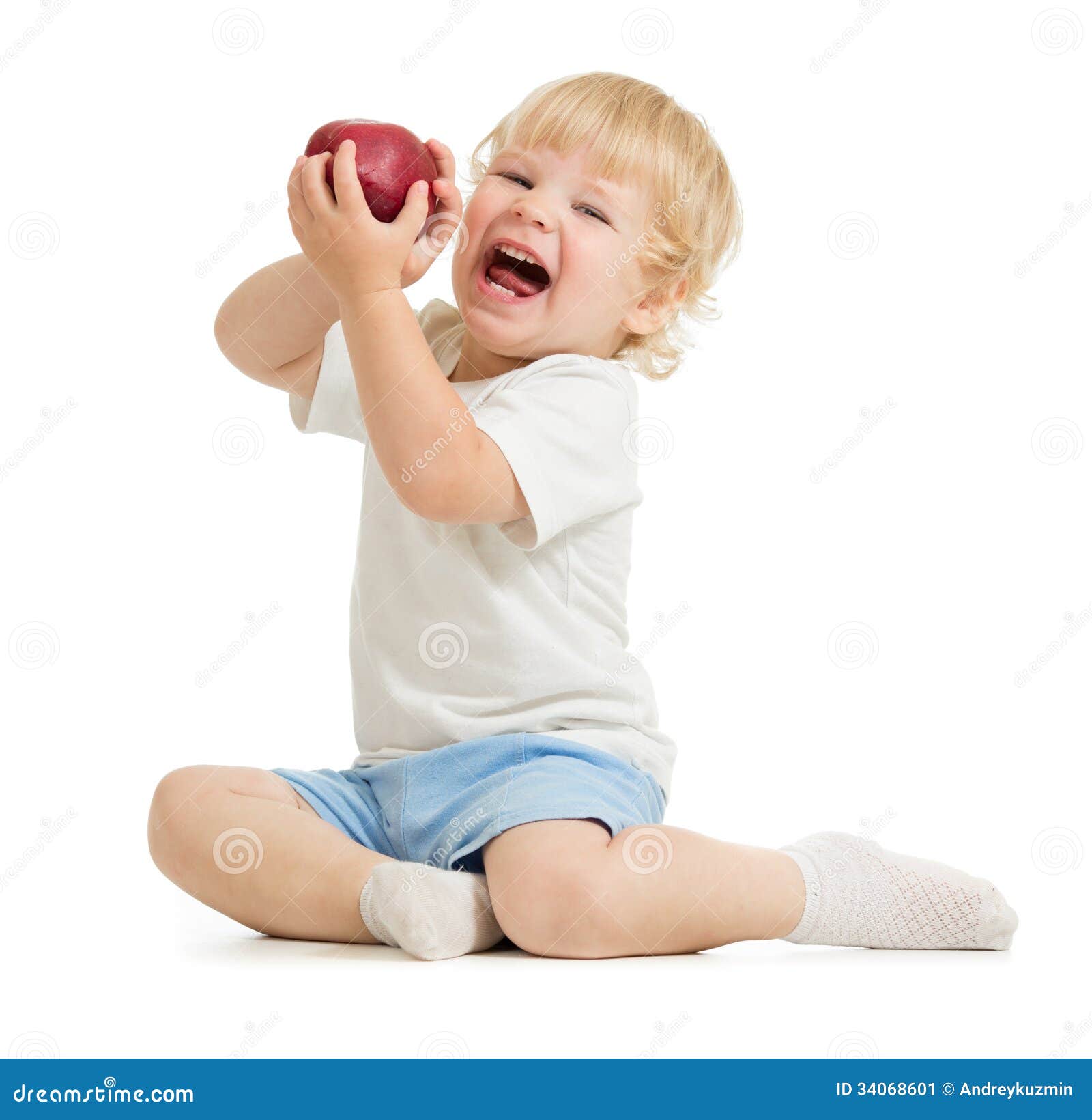 Happy kid eating apple stock image. Image of adorable - 34068601