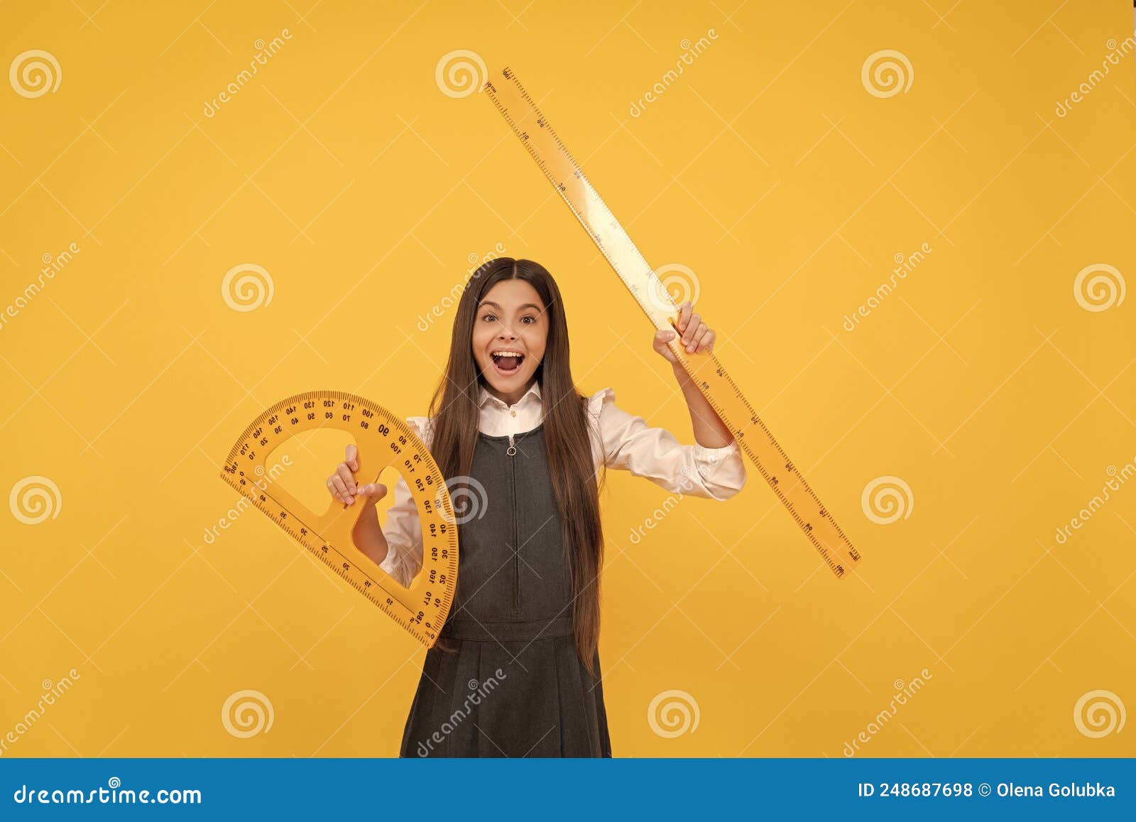 Happy Kid Hold Math Protractor and Ruler in School on Yellow Background ...