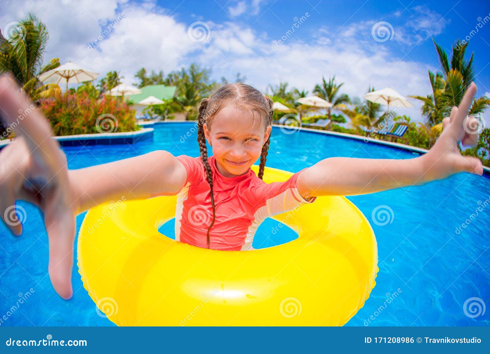 Happy Kid with Inflatable Rubber Circle Having Fun on the Beach Stock ...
