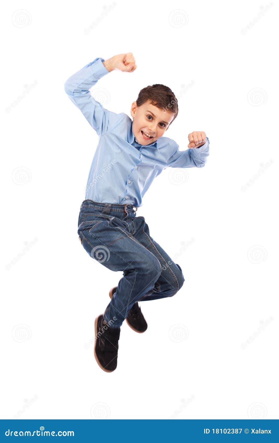 Happy kid jumping for joy stock image. Image of confident - 18102387