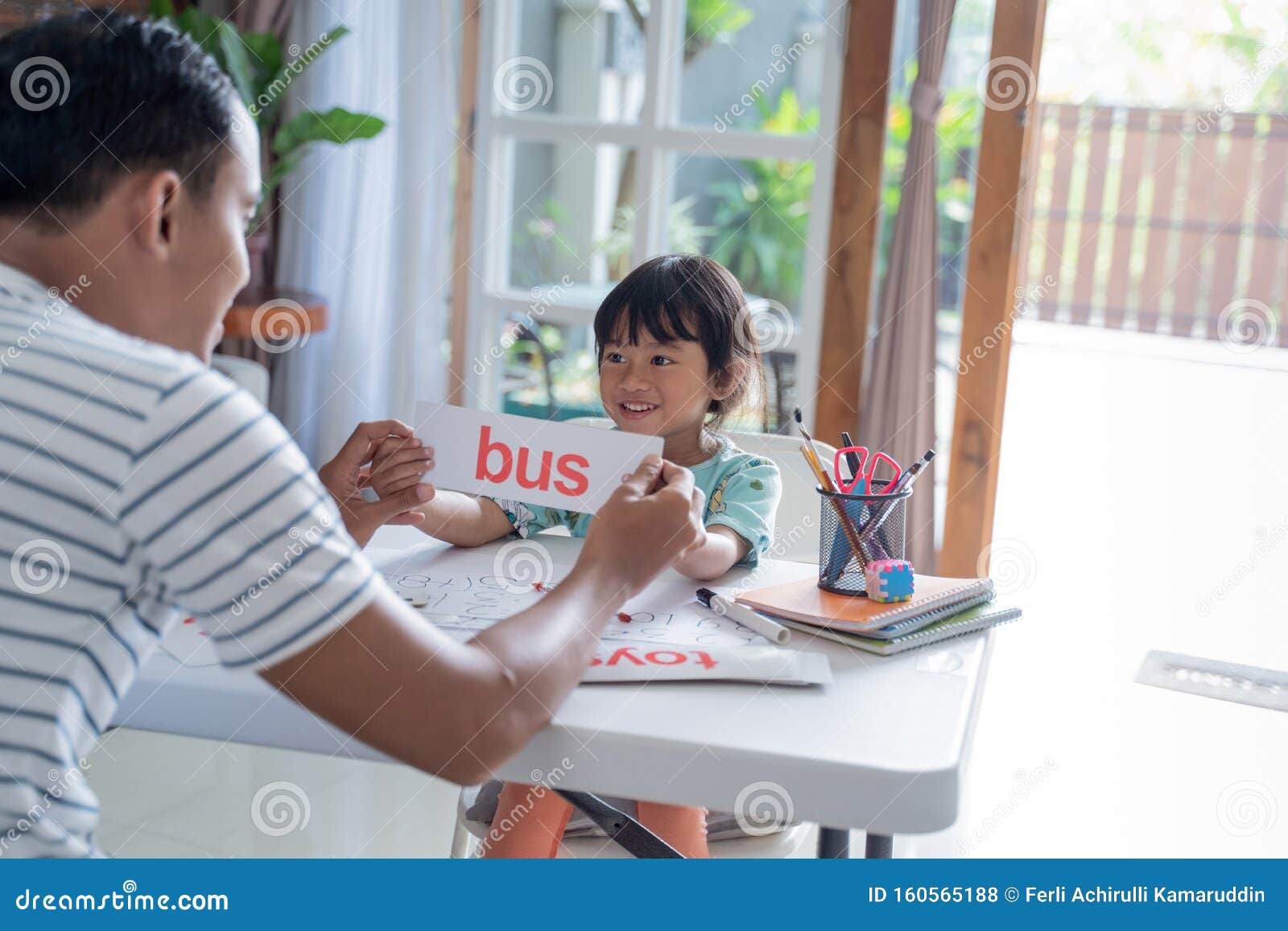 Happy Kid Learning and Studying Together with Parent at Home Stock ...