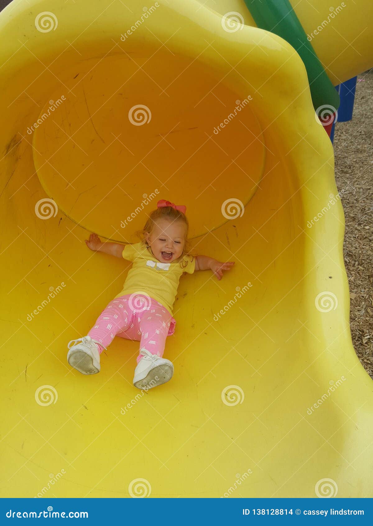 Fun on a slide stock photo. Image of slide, happy, park - 138128814