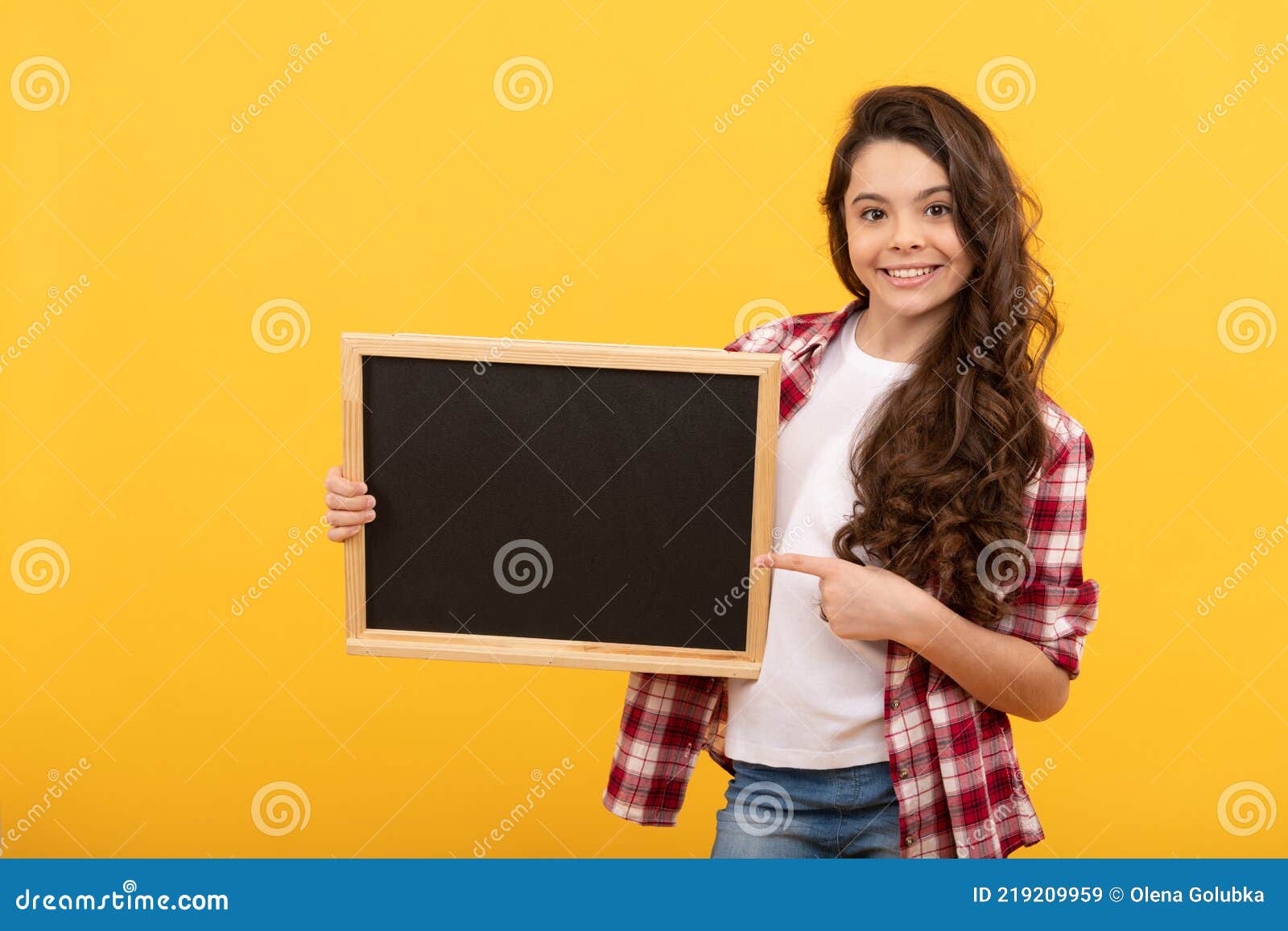 Happy Kid Pointing Finger on School Blackboard for Copy Space ...