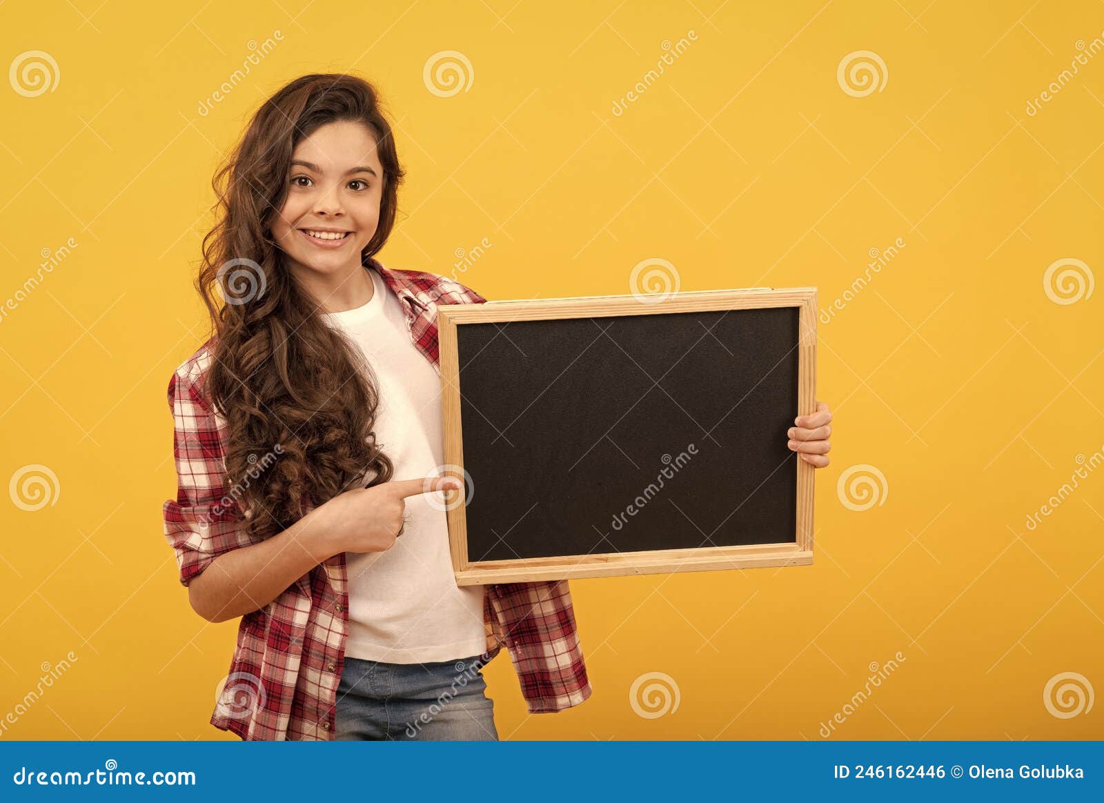 Happy Kid Pointing Finger on School Blackboard for Copy Space ...