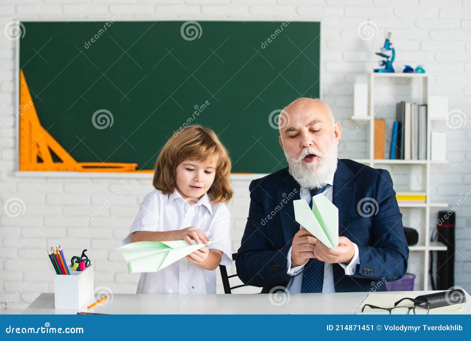 Teacher Help Schoolgirl. Little Girl With Man Tutor Study Science ...
