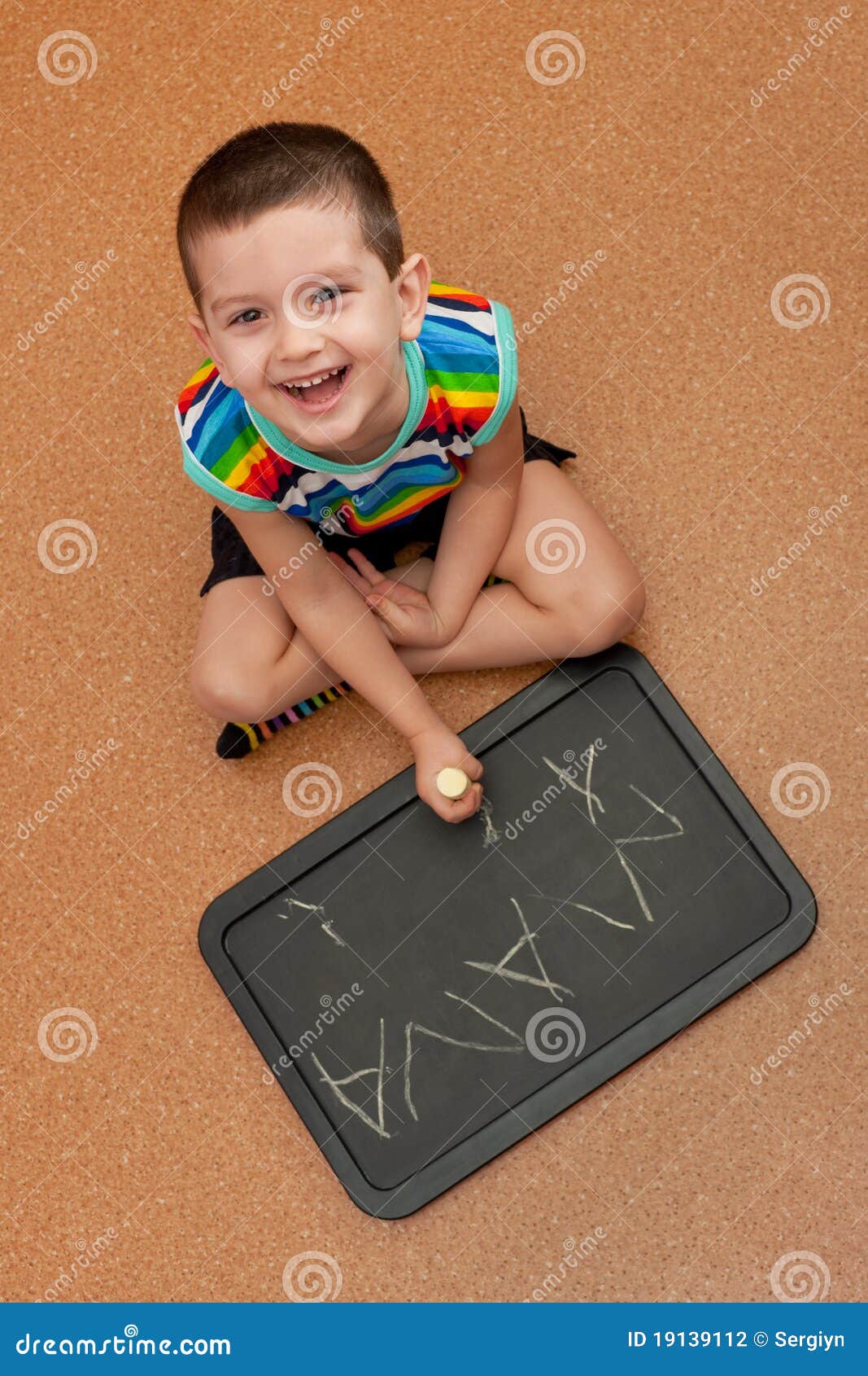 Happy Kid is Studying Writing on the Blackboard Stock Photo - Image of ...