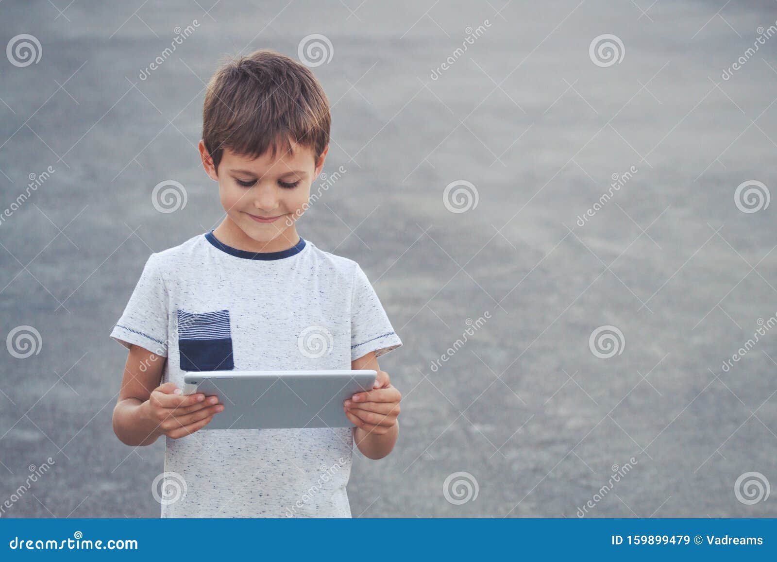 Happy Kid with Tablet Computer Outdoors Stock Image - Image of alone ...
