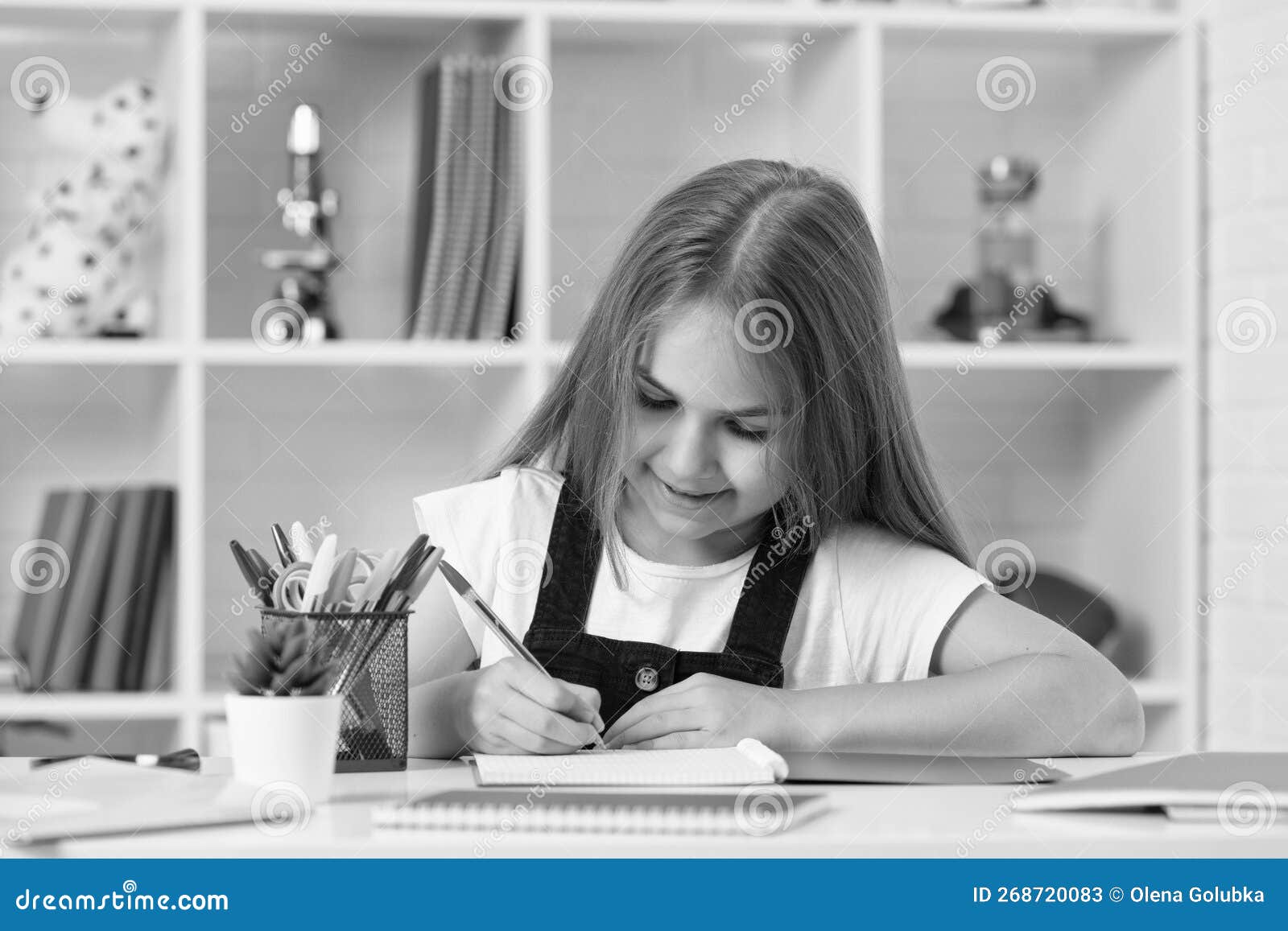 Happy Kid Write in Workbook at School Lesson in Classroom Wear Uniform ...