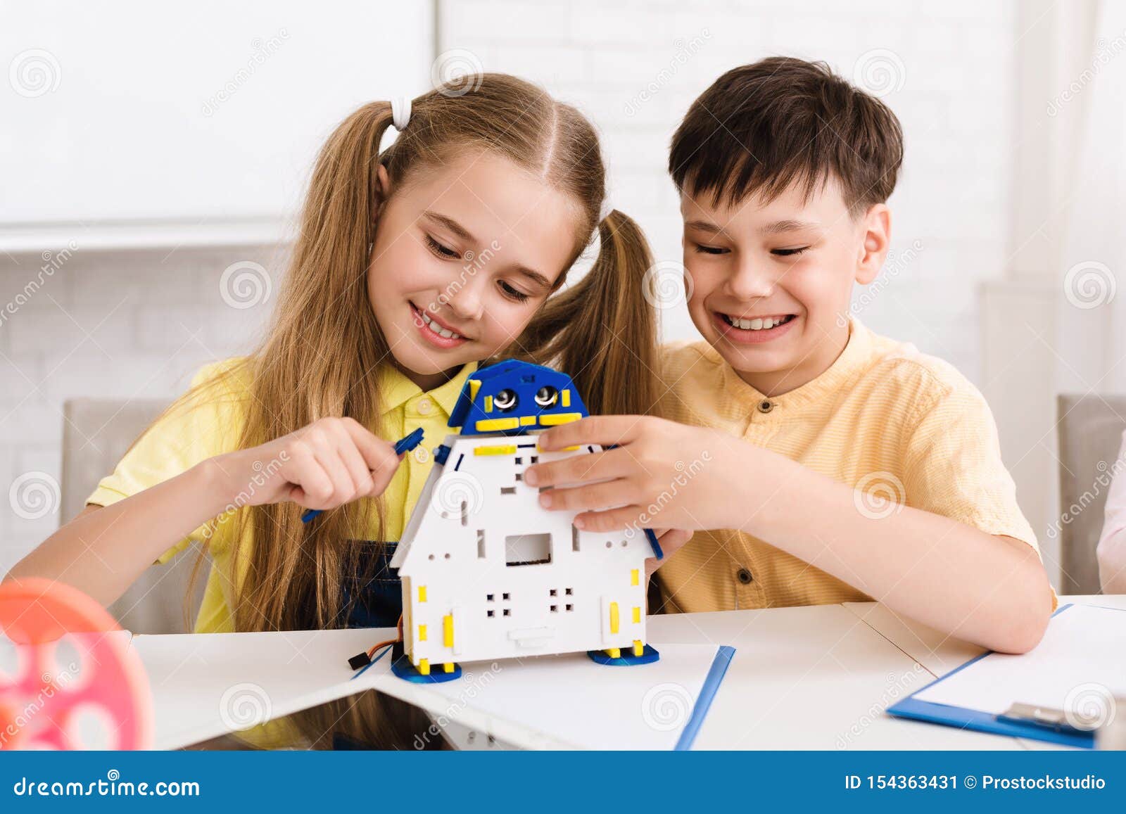 Happy Kids Constructing Robotic Toy at Stem Class Stock Image - Image ...