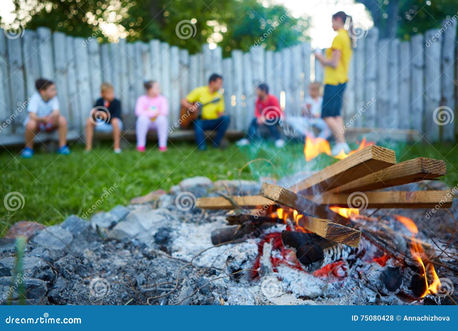 Happy Kids Having Fun Around Camp Fire Stock Photo - Image of candid ...