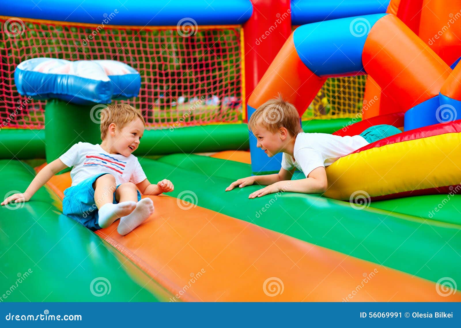 Happy Kids Having Fun on Inflatable Attraction Playground Stock Image ...