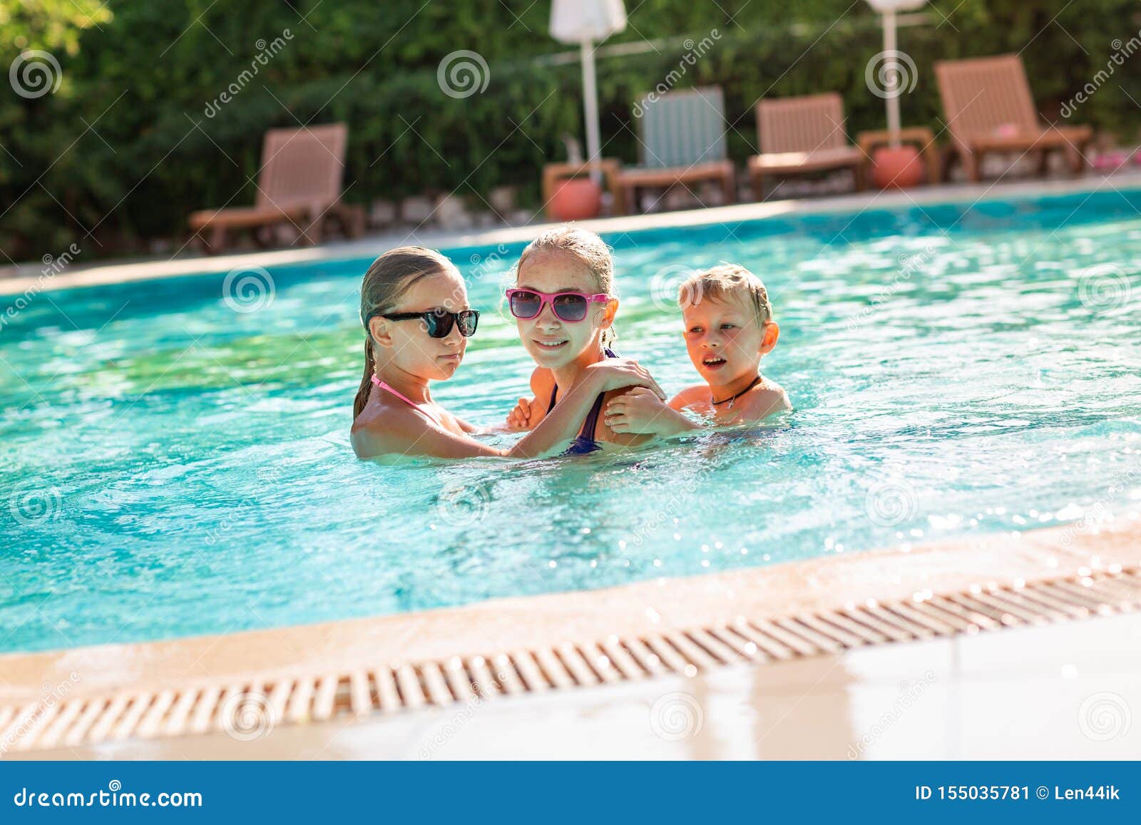Happy Kids Having Fun at the Pool Stock Image - Image of girl, resort ...