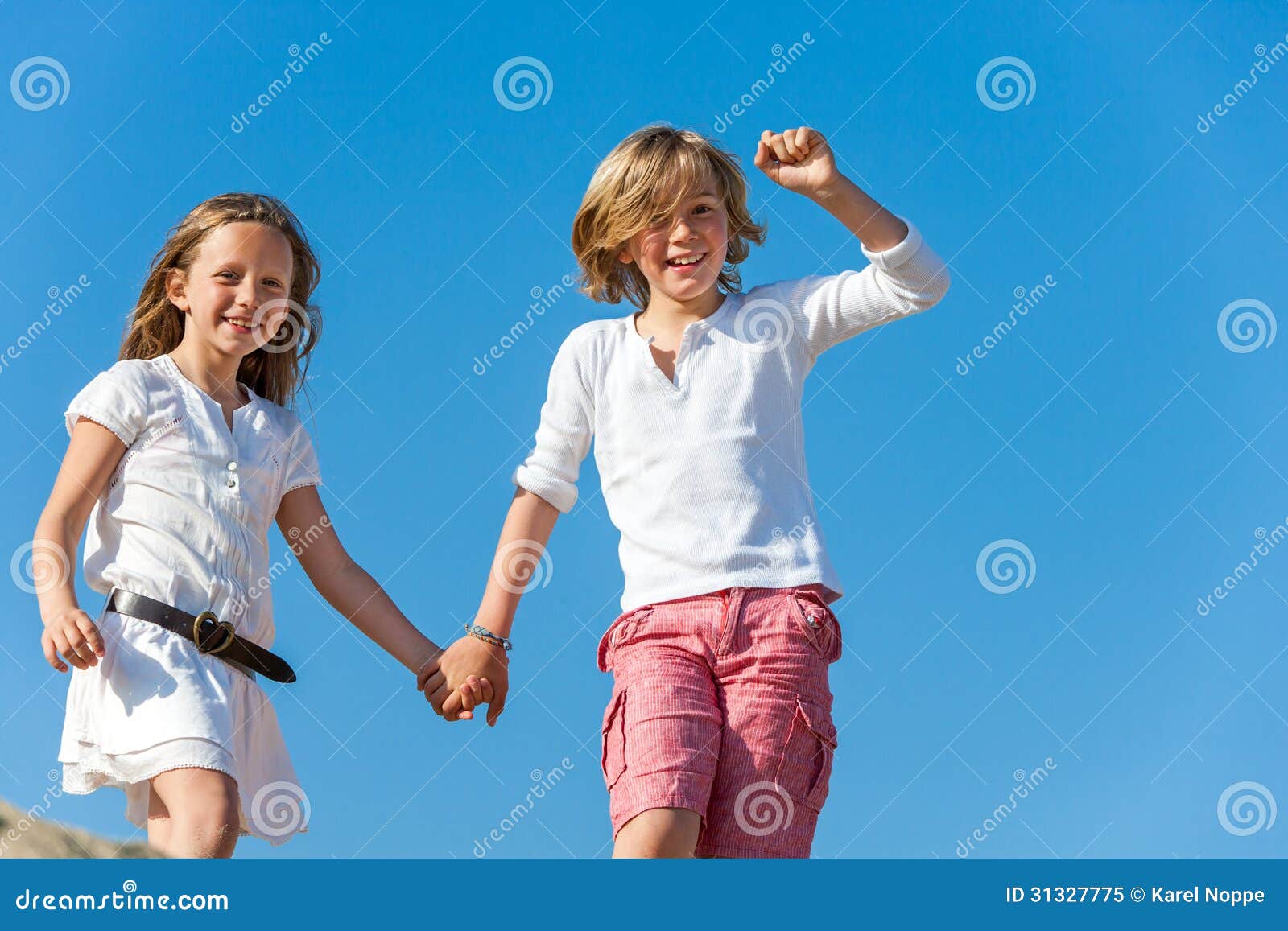 Two Children Holding Hands