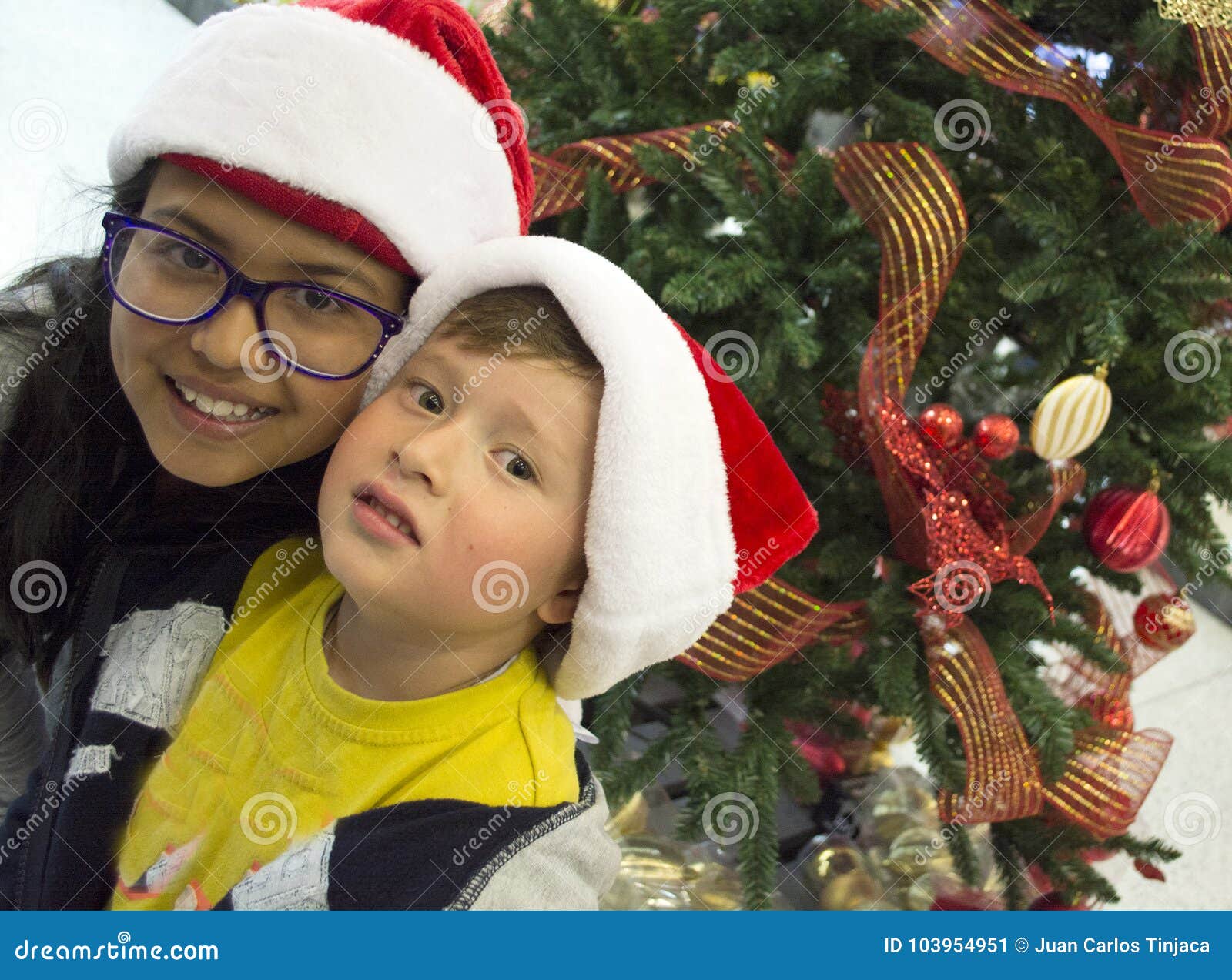 Happy Kids Laying Under the Christmas Tree. Stock Image - Image of gift ...
