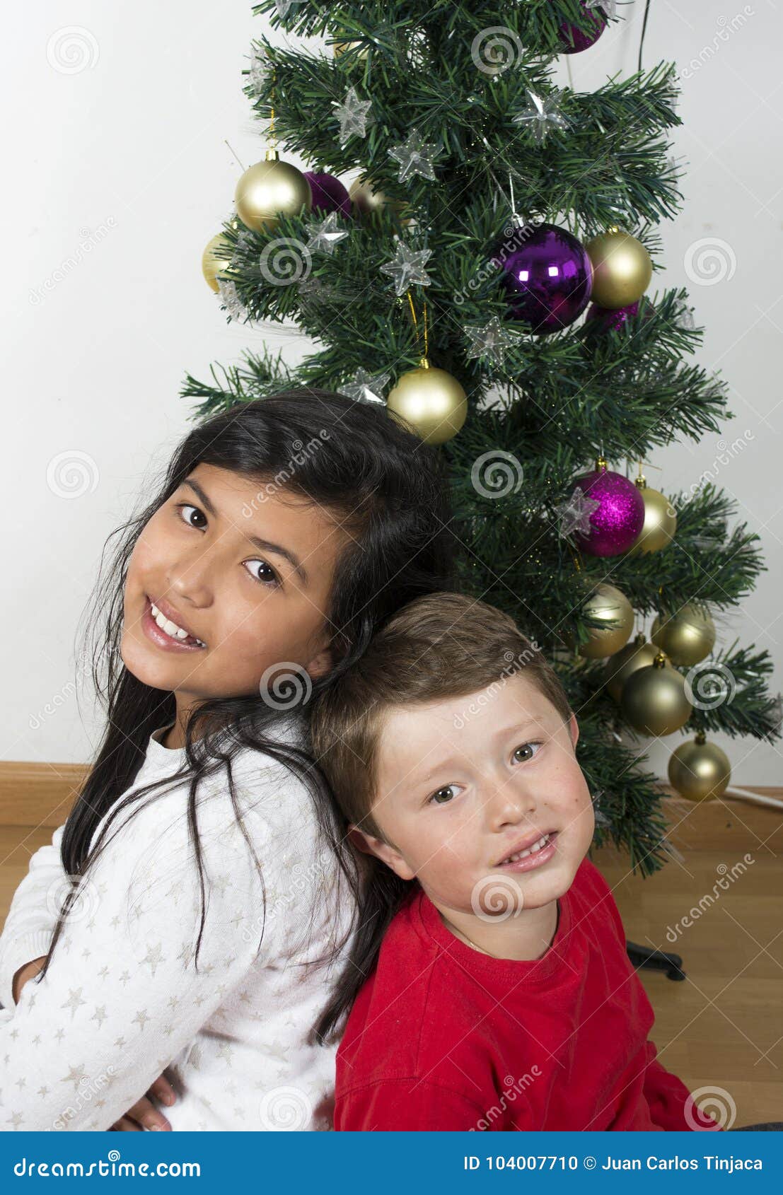 Happy Kids Laying Under the Christmas Tree. Stock Photo - Image of copy ...