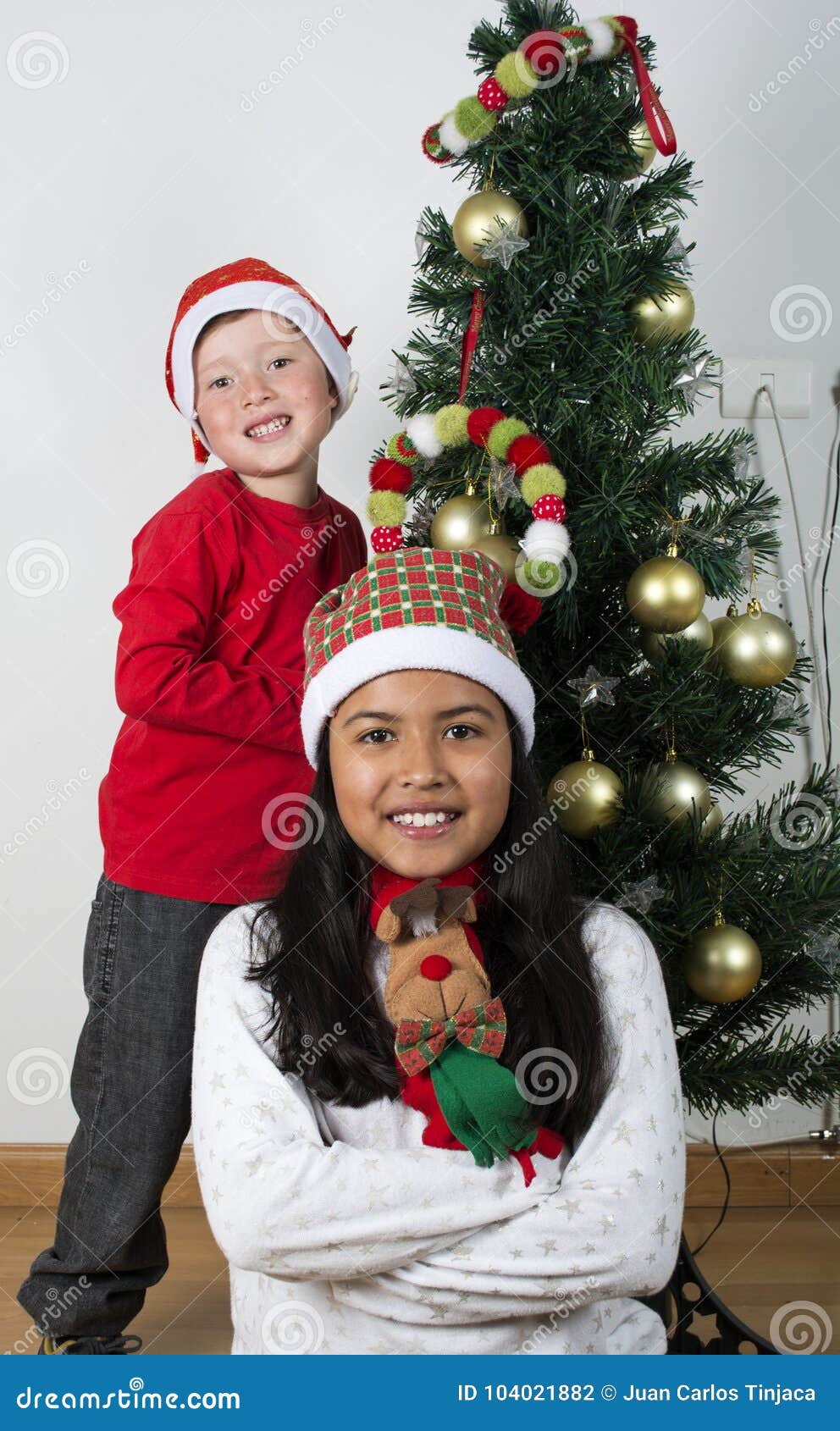 Happy Kids Laying Under the Christmas Tree. Stock Photo - Image of ...