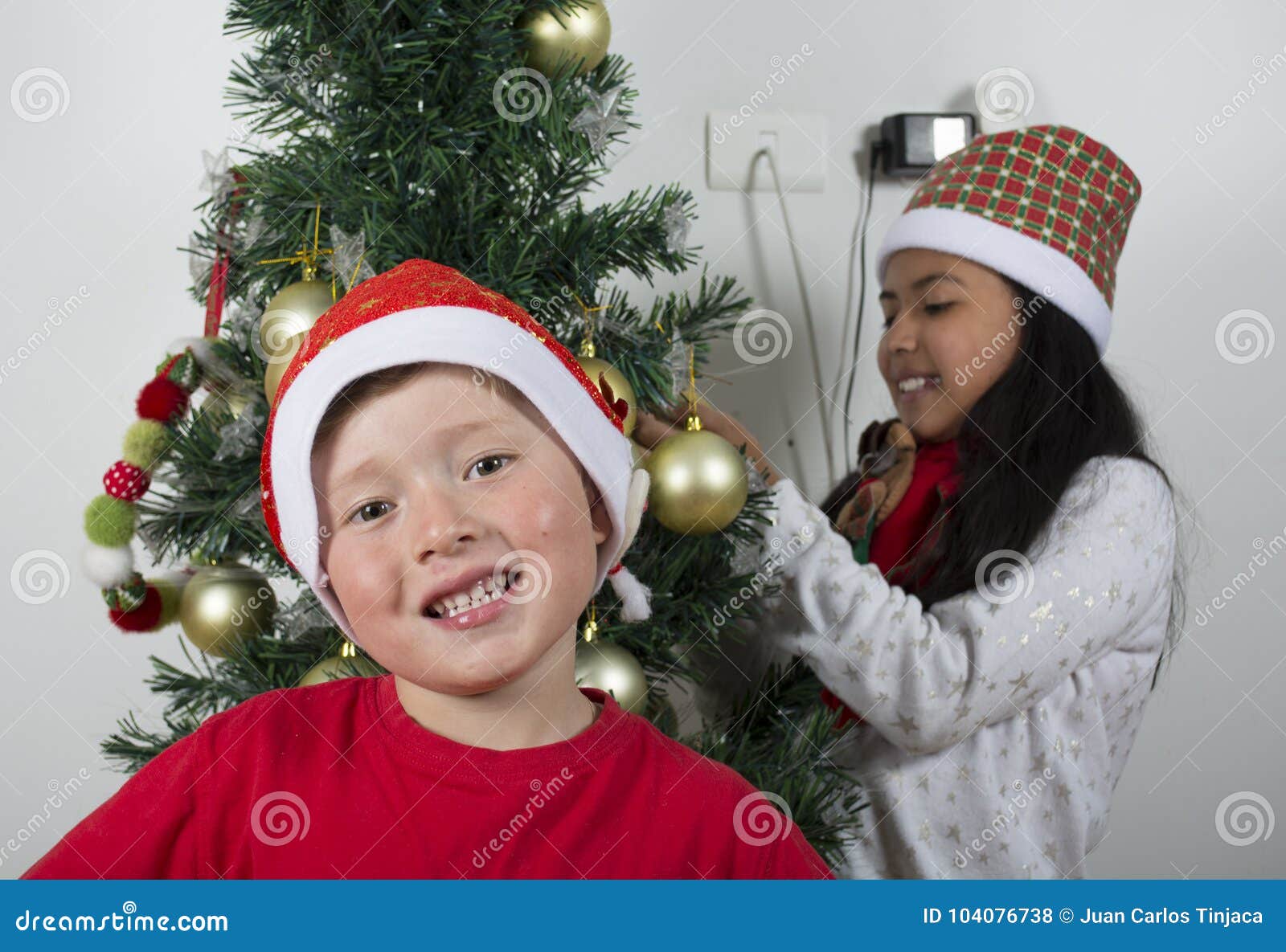 Happy Kids Laying Under the Christmas Tree. Stock Photo - Image of face ...