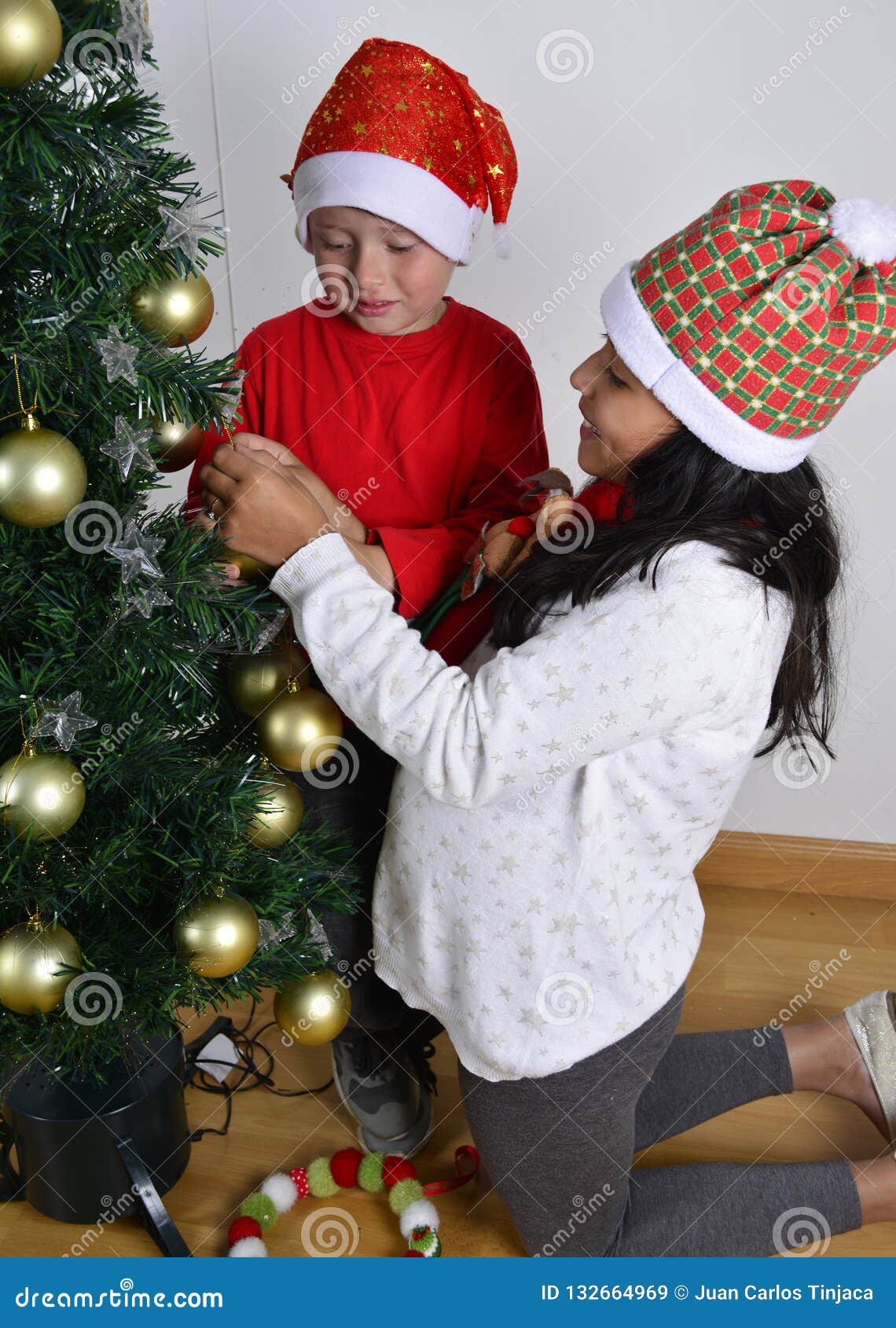 Happy Kids Laying Under the Christmas Tree Stock Image - Image of ...