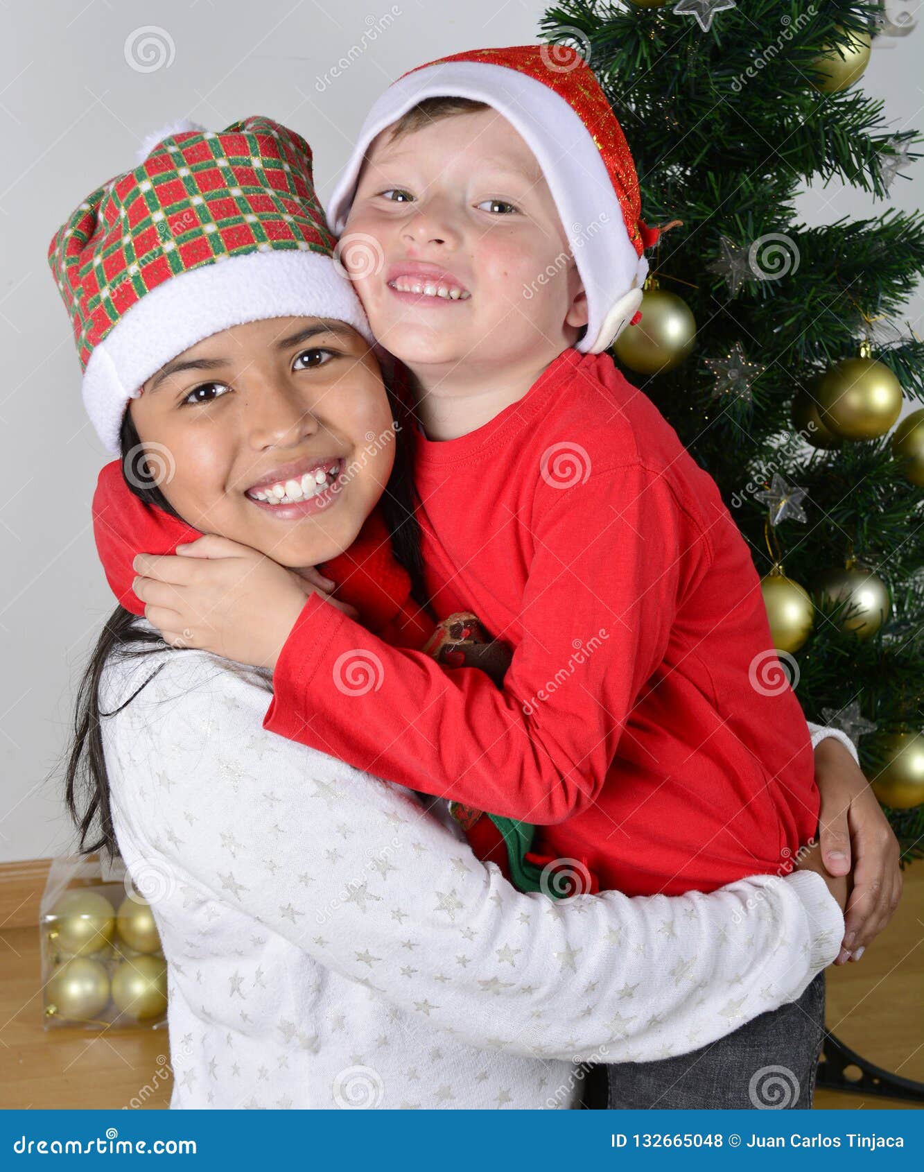 Happy Kids Laying Under the Christmas Tree Stock Photo - Image of laugh ...