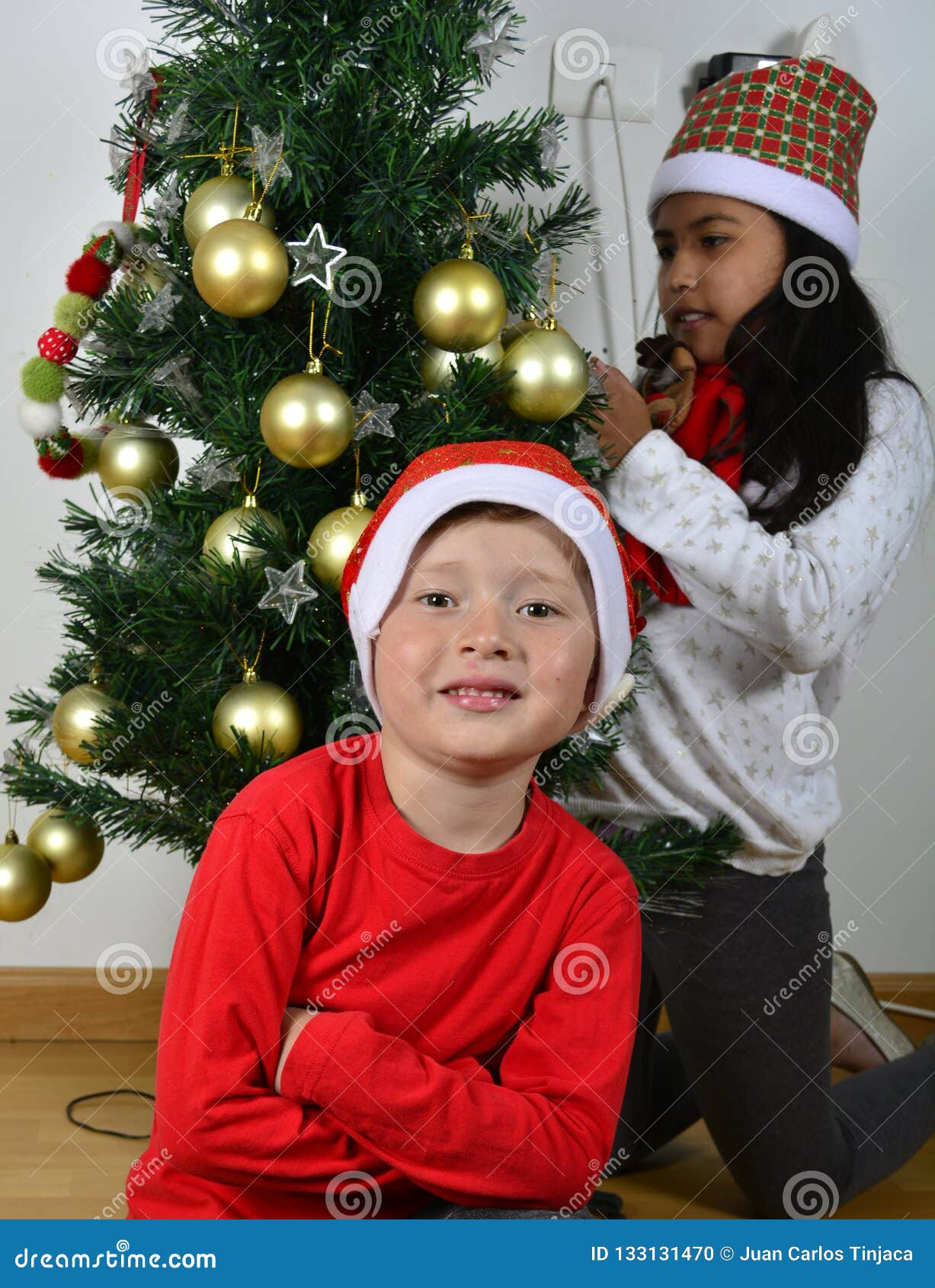 Happy Kids Laying Under the Christmas Tree Stock Photo - Image of ...