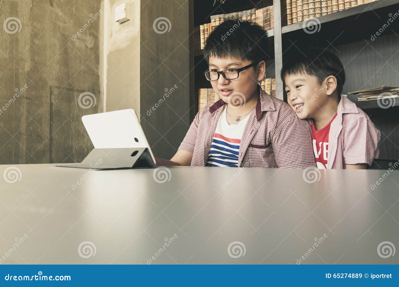 Happy Kids Looking at Tablet Computer Stock Image - Image of library ...