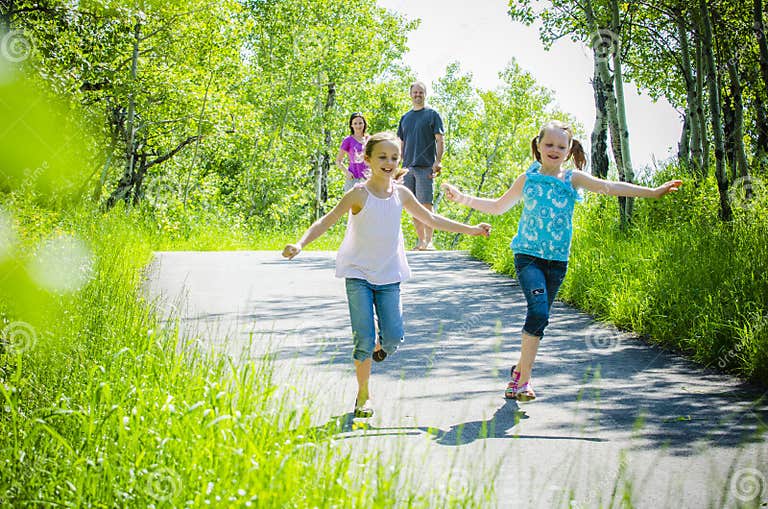 Happy kids on path stock photo. Image of happy, green - 28439770