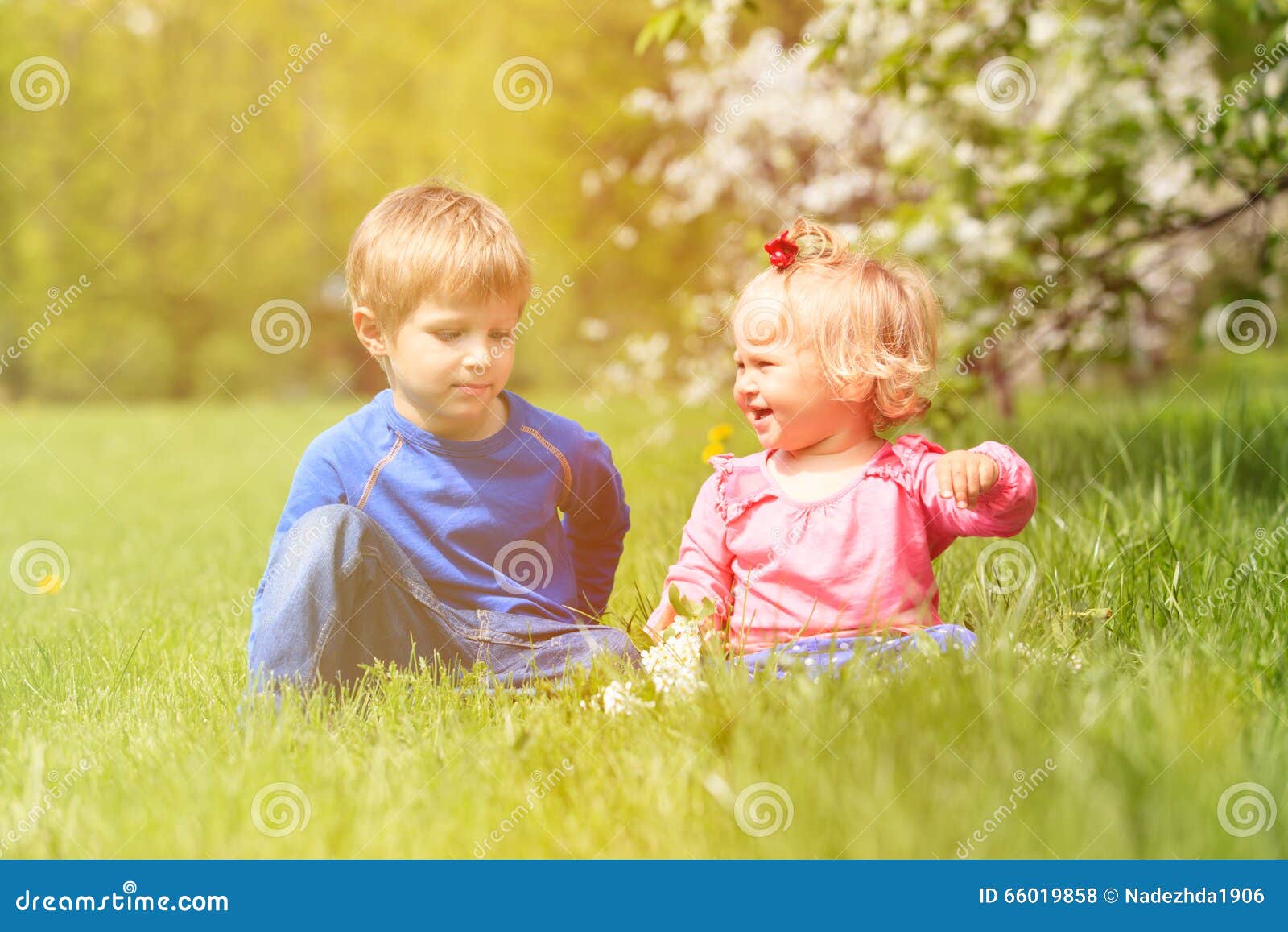 Happy Kids Play with Spring Flowers Stock Photo - Image of playing ...
