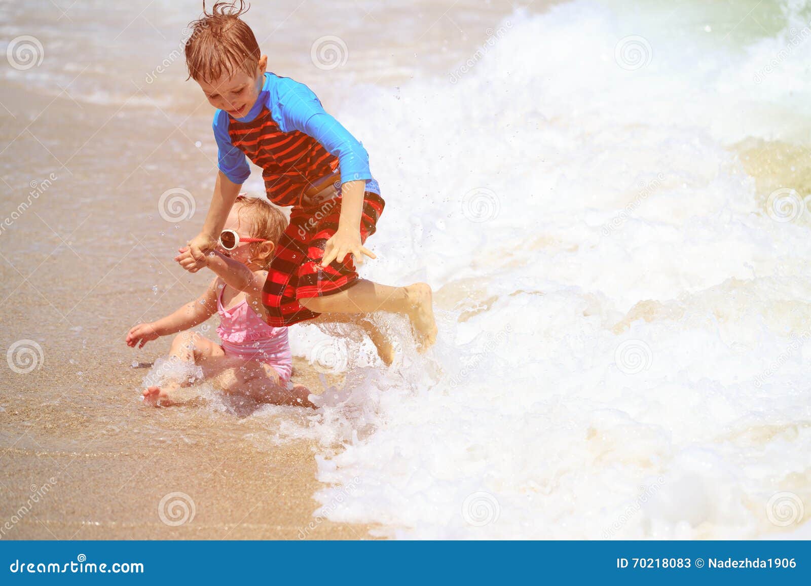 Happy Kids Play with Waves on Beach Stock Image - Image of childhood ...