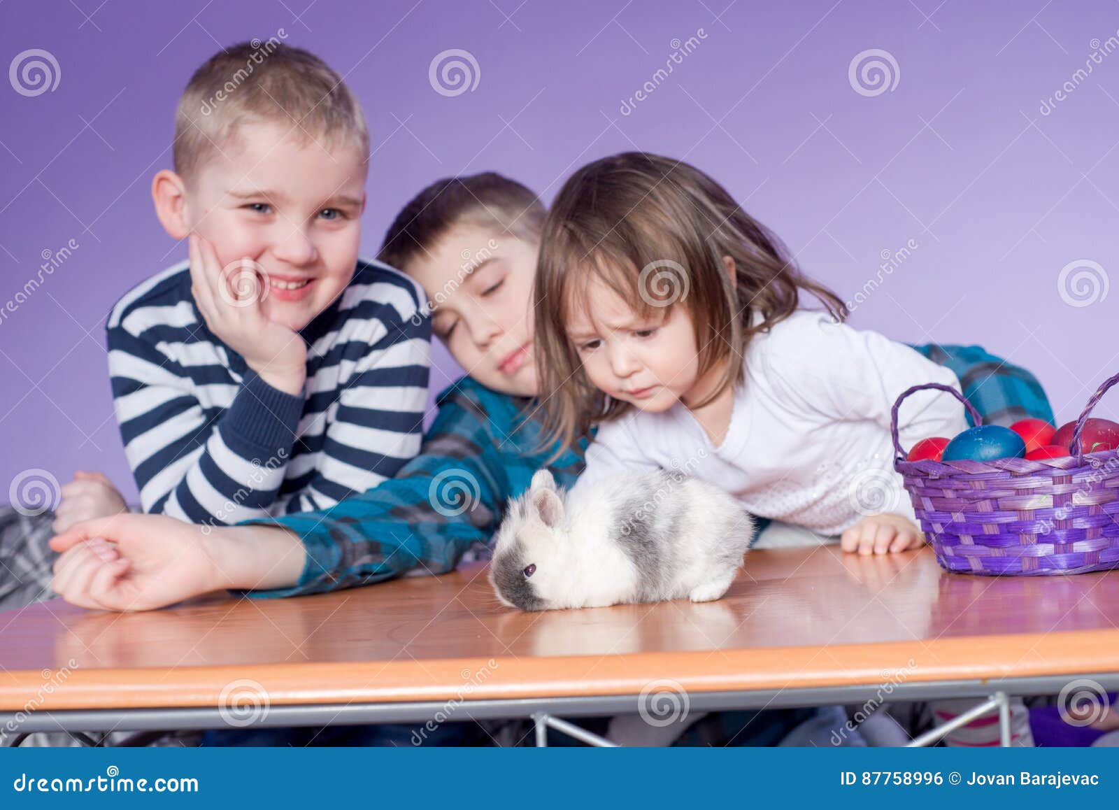 Happy Kids Playing on Easter with Bunny Stock Photo - Image of wooden ...