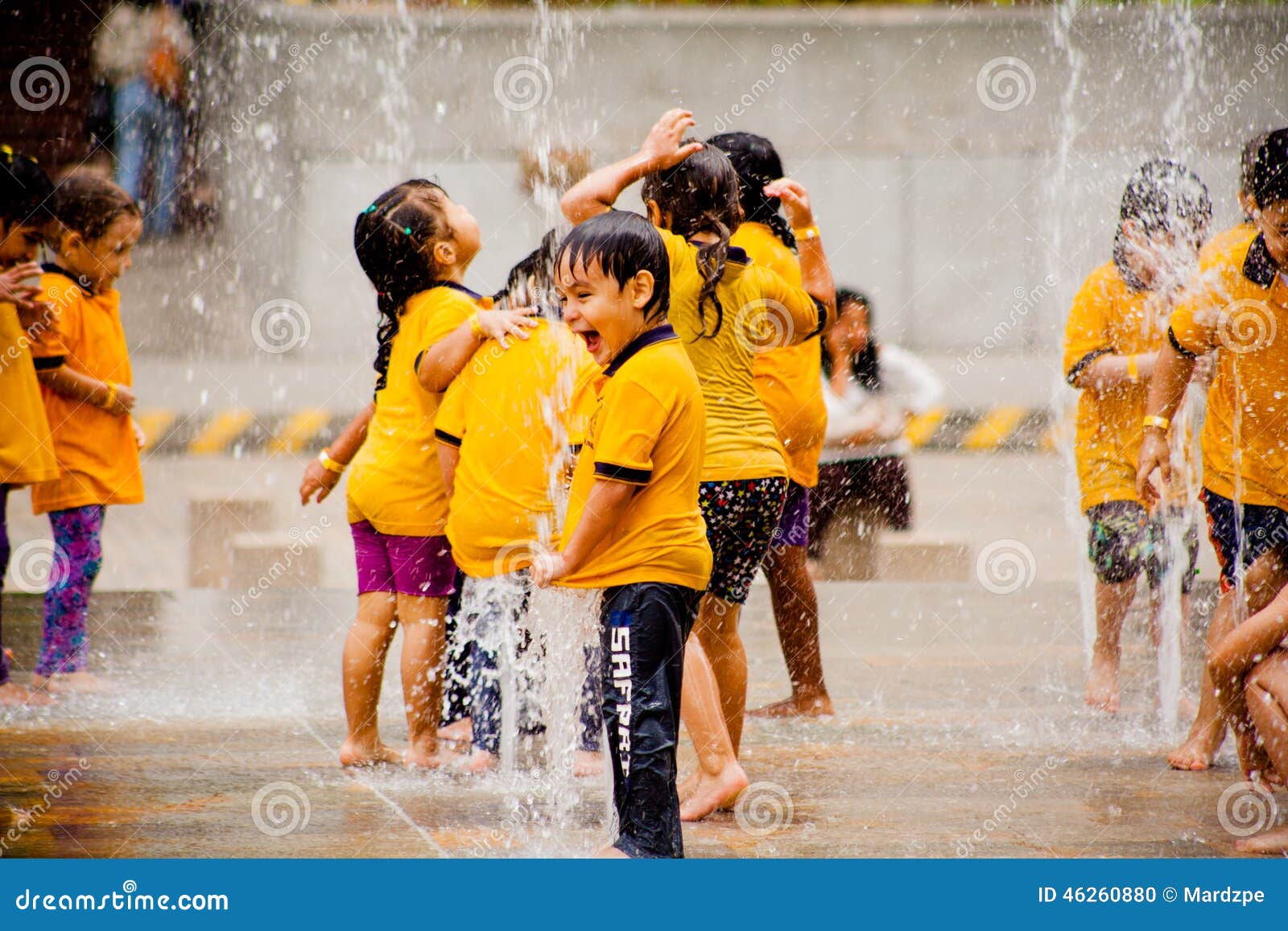 Happy Kids Playing in the Water Fountain Editorial Image - Image of ...