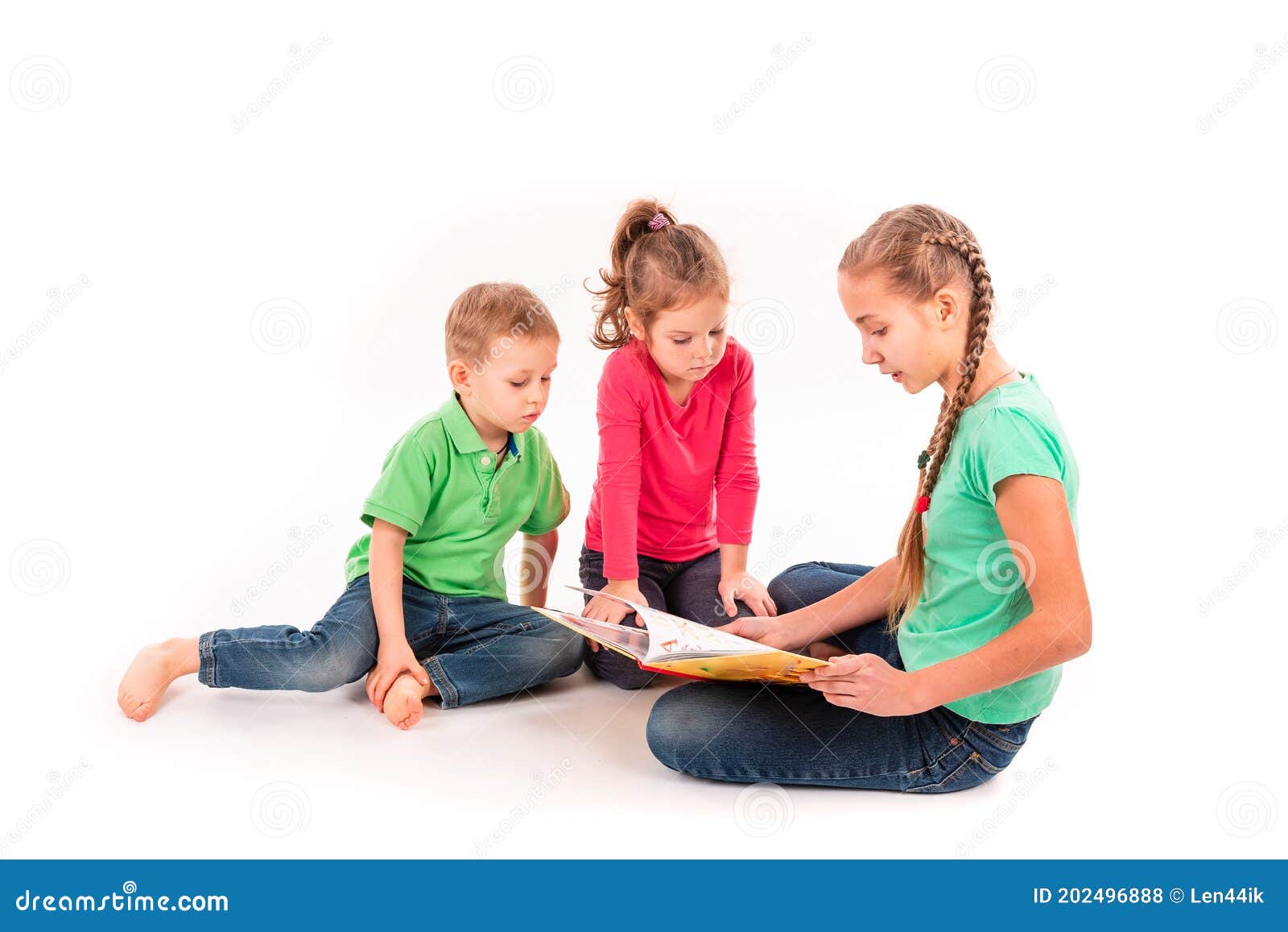 Happy Kids Reading a Book Isolated on White Stock Photo - Image of ...