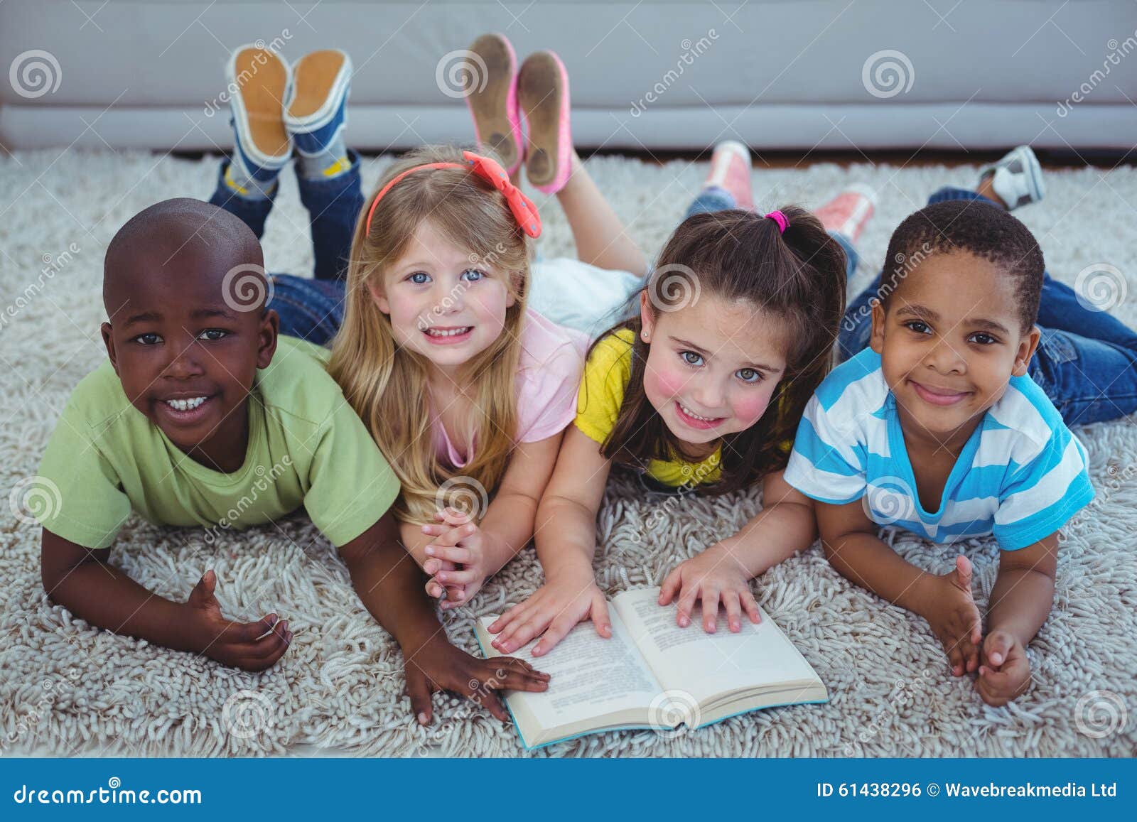 Happy Kids Reading a Book Together Stock Photo - Image of friendship ...