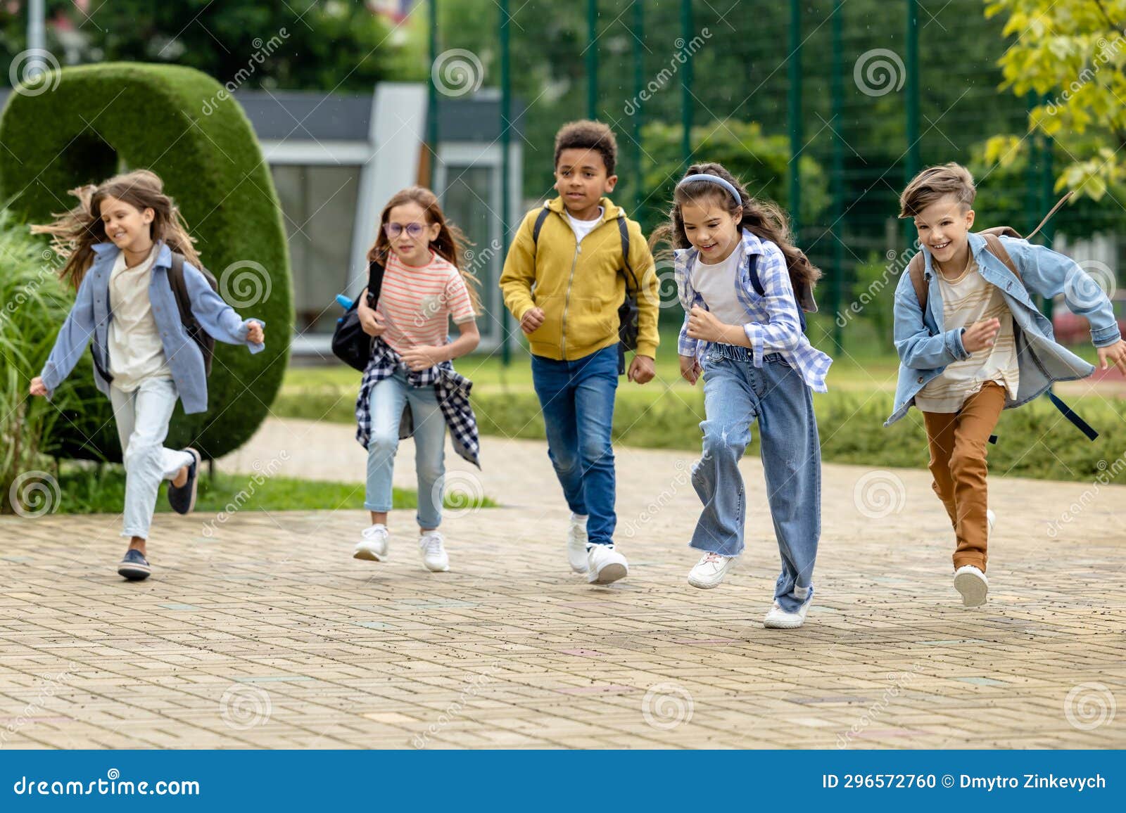 Happy Kids Running at the School Yard Stock Photo - Image of education ...