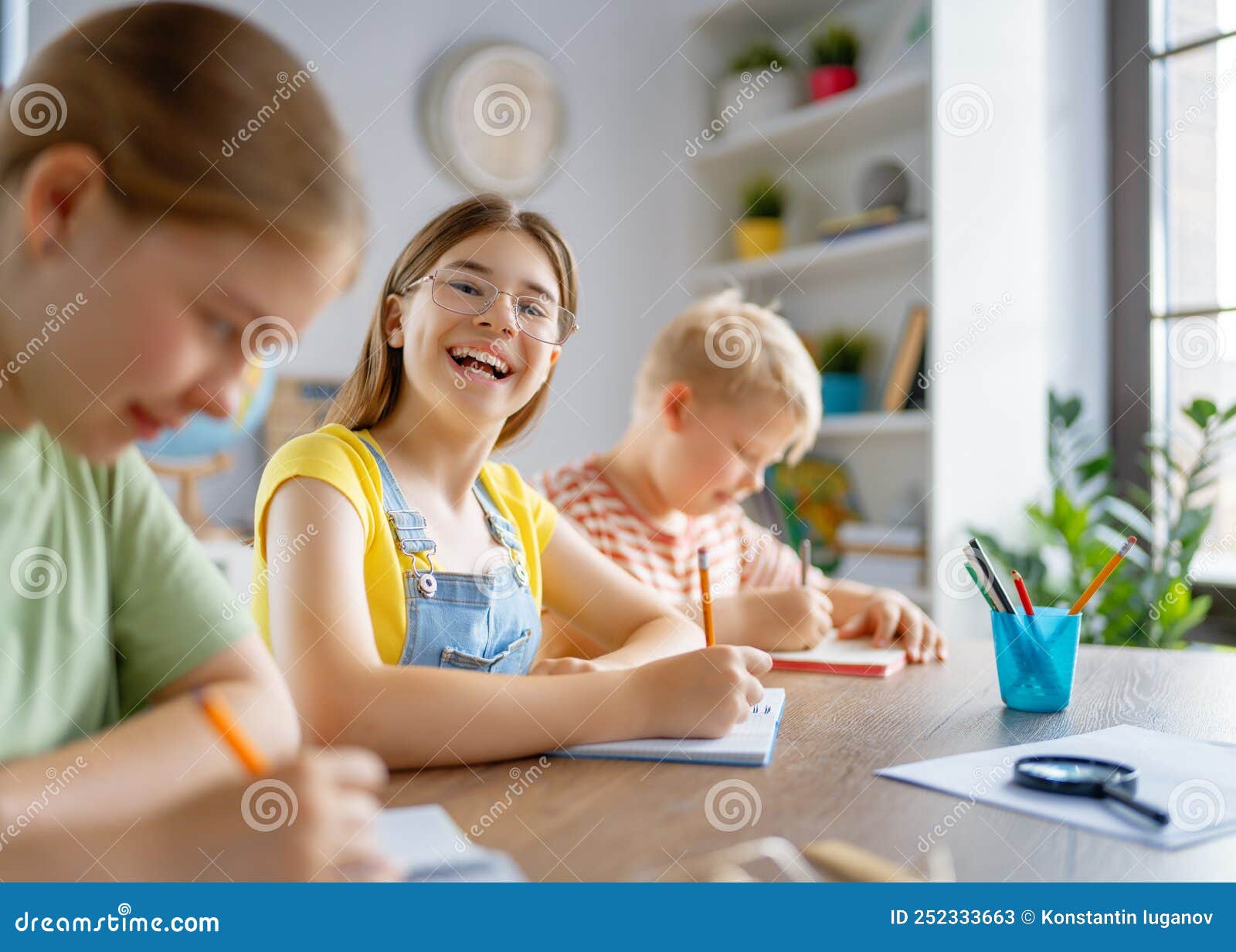 Happy kids at school stock image. Image of education - 252333663