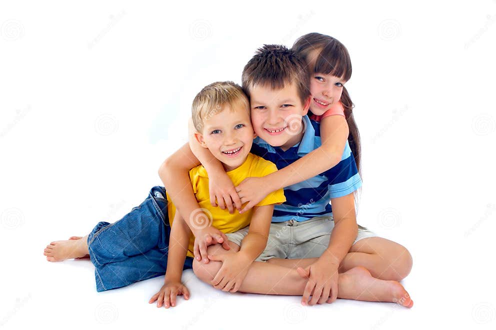 Happy kids sharing a hug stock photo. Image of affectionate - 3226006