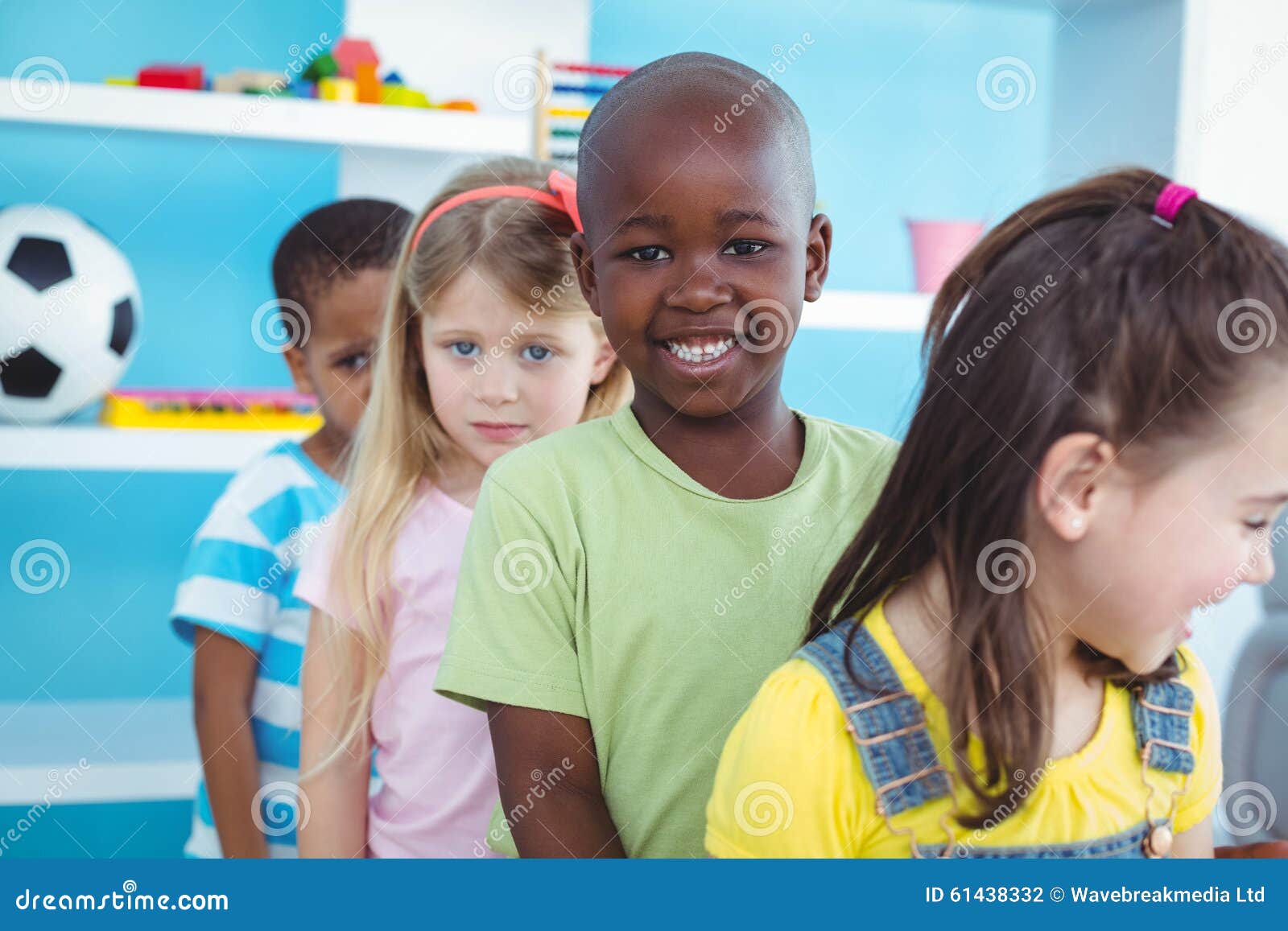 Happy Kids Standing in a Line Stock Photo - Image of black, friends ...