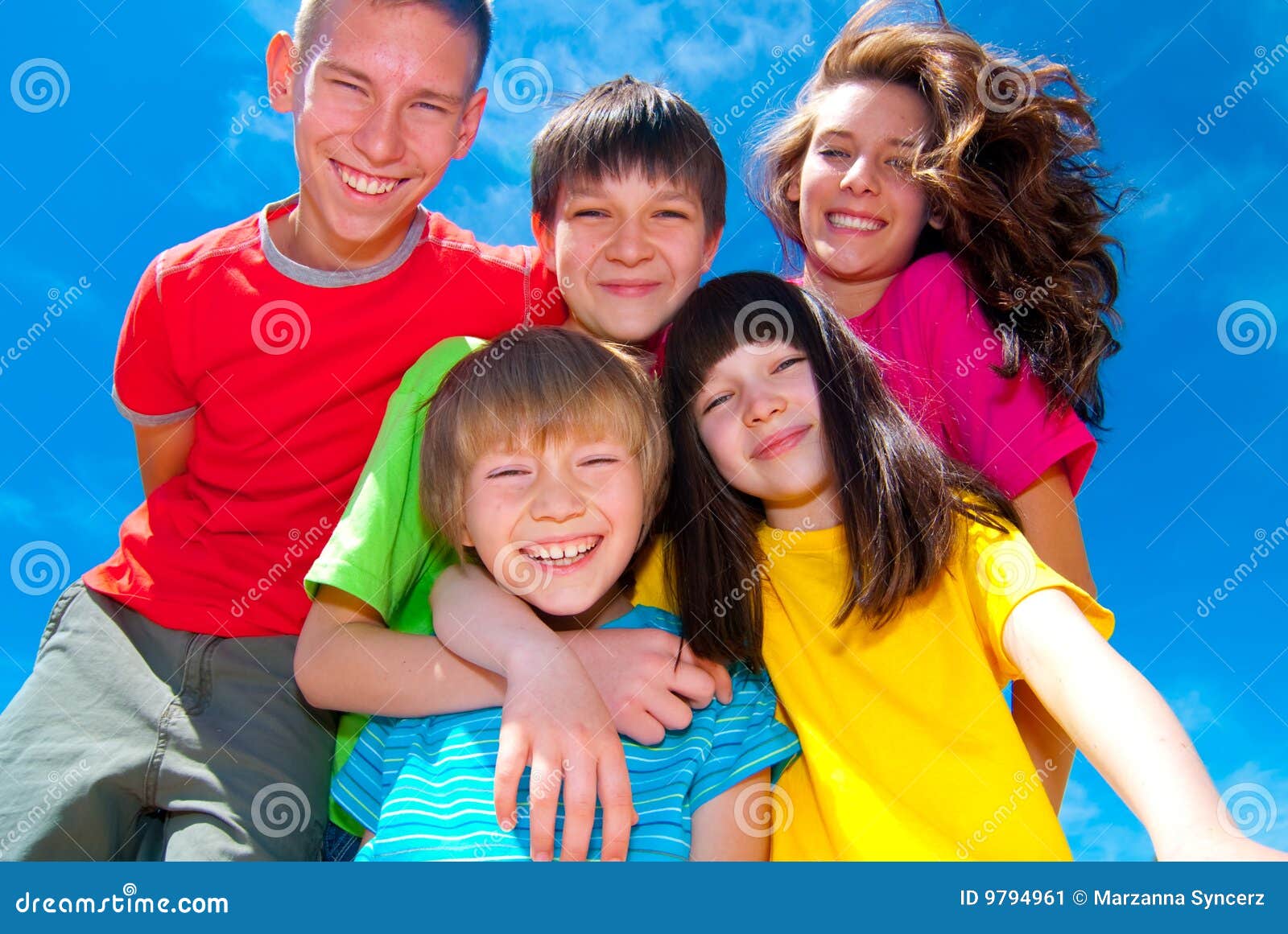 Happy kids under blue sky stock image. Image of children - 9794961