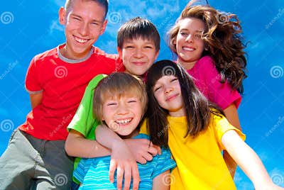 Happy kids under blue sky stock image. Image of children - 9794961