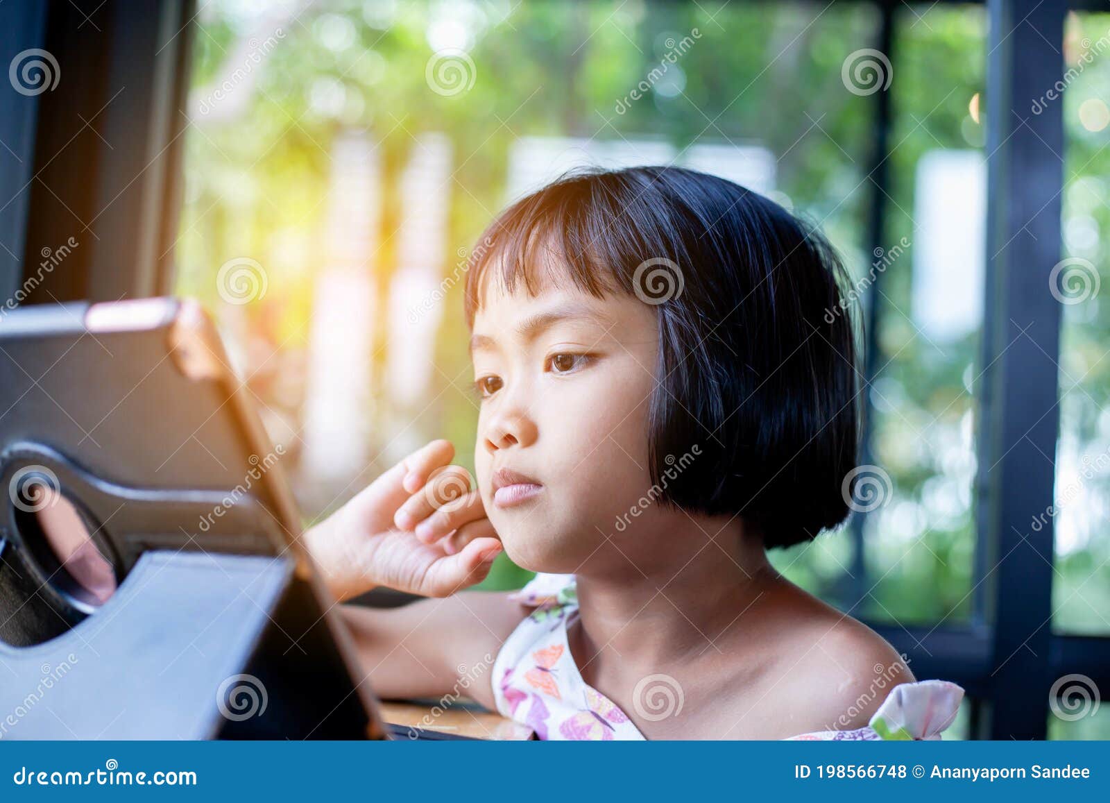 Happy Kids Using a Laptop Computer at Home Stock Photo - Image of ...