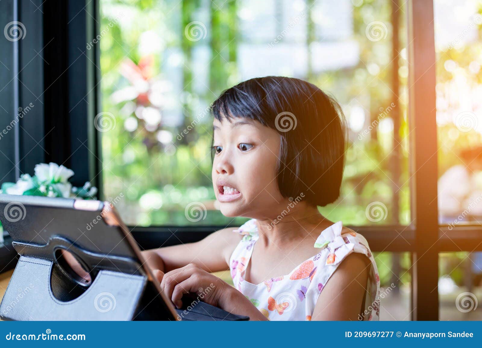 Happy Kids Using a Laptop Computer at Home Stock Image - Image of ...