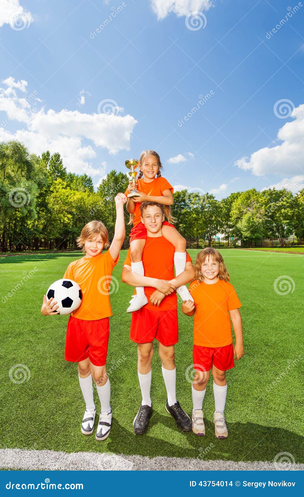 Happy Kids with Won Cup Stand in Pyramid Stock Photo - Image of kids ...