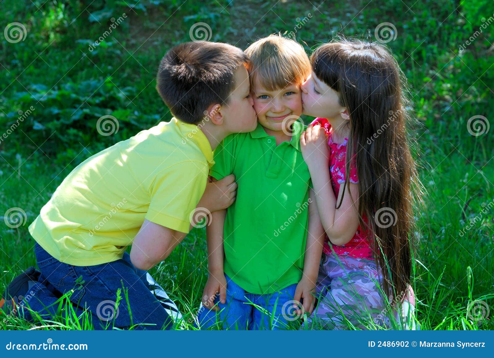 Happy kissing children stock photo. Image of childhood - 2486902
