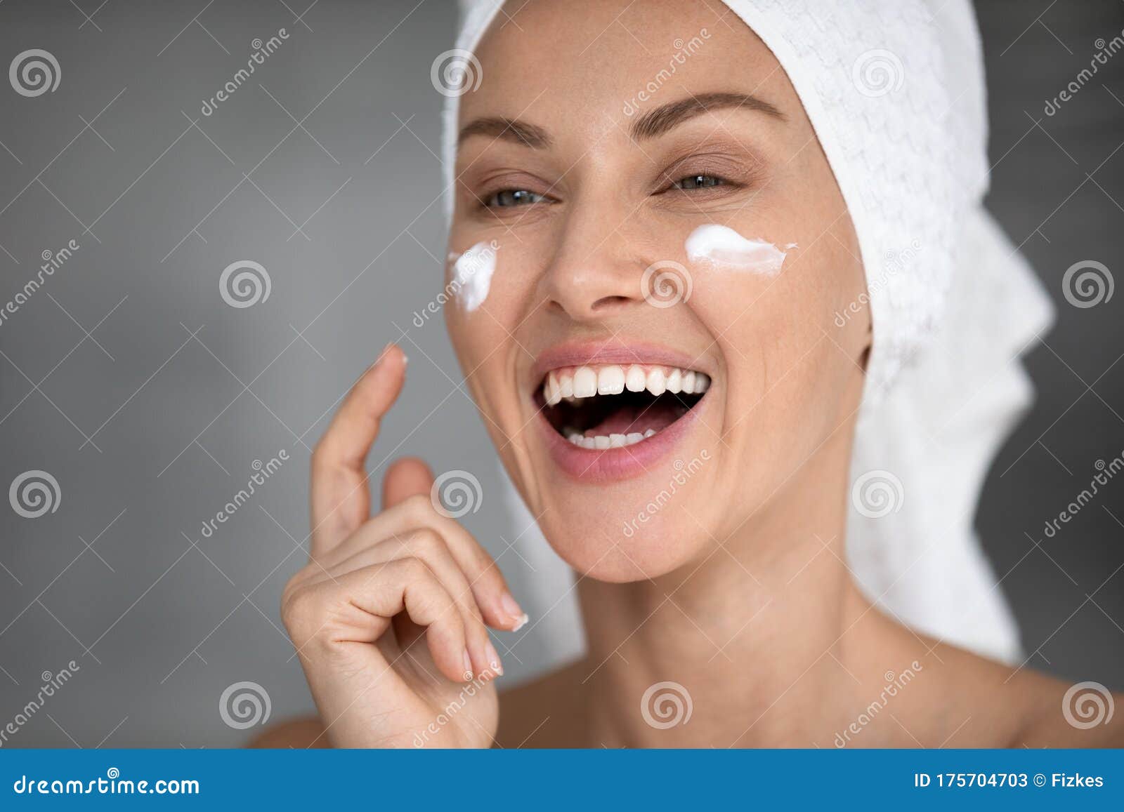 Happy Lady Grooming Herself In Bathroom Skincare Routine Stock Image
