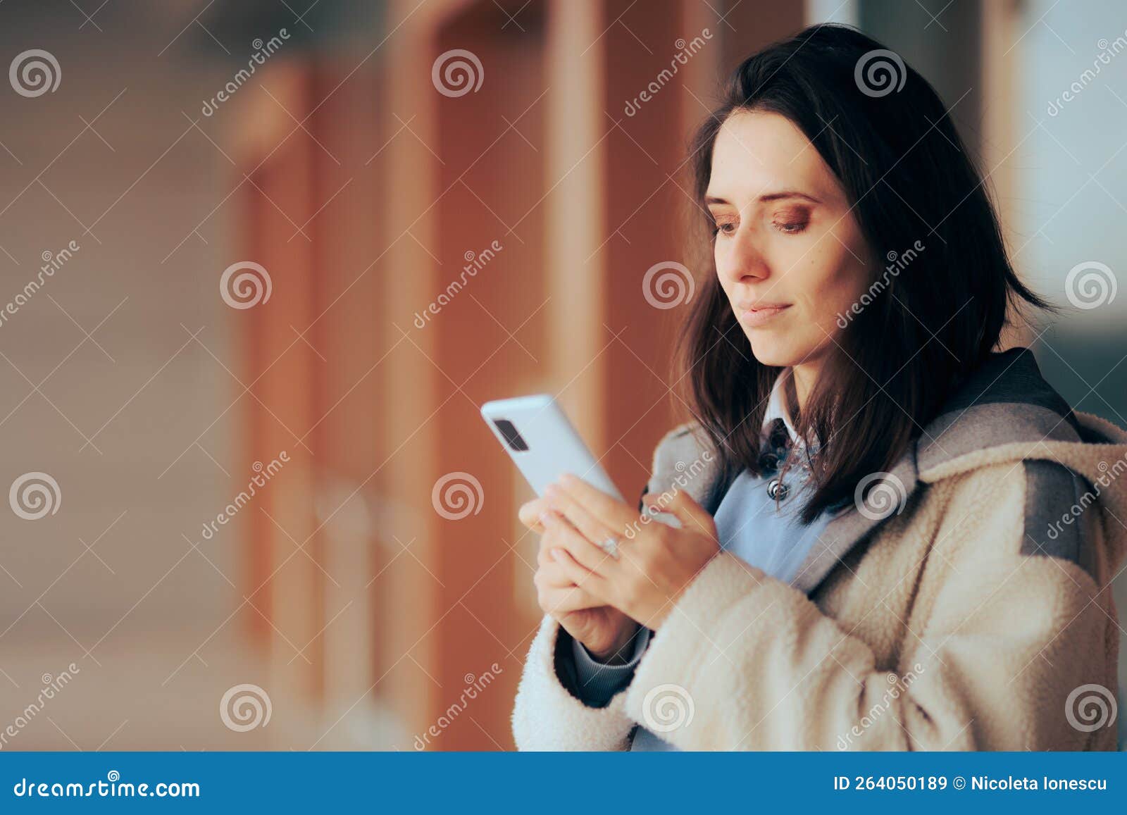 Happy Woman Reading a Text Message on Her Phone Stock Image - Image of ...