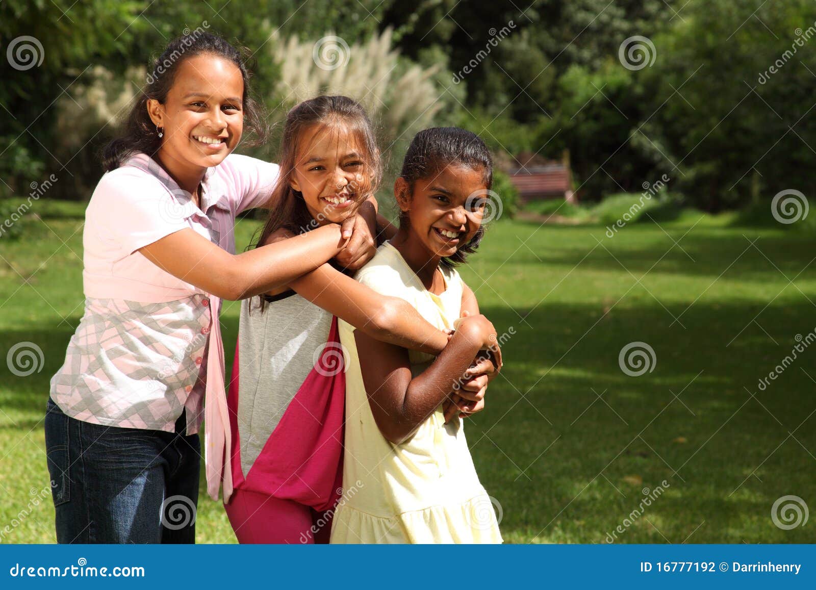 Happy Laughter and Hugs from Three School Friends Stock Photo - Image ...