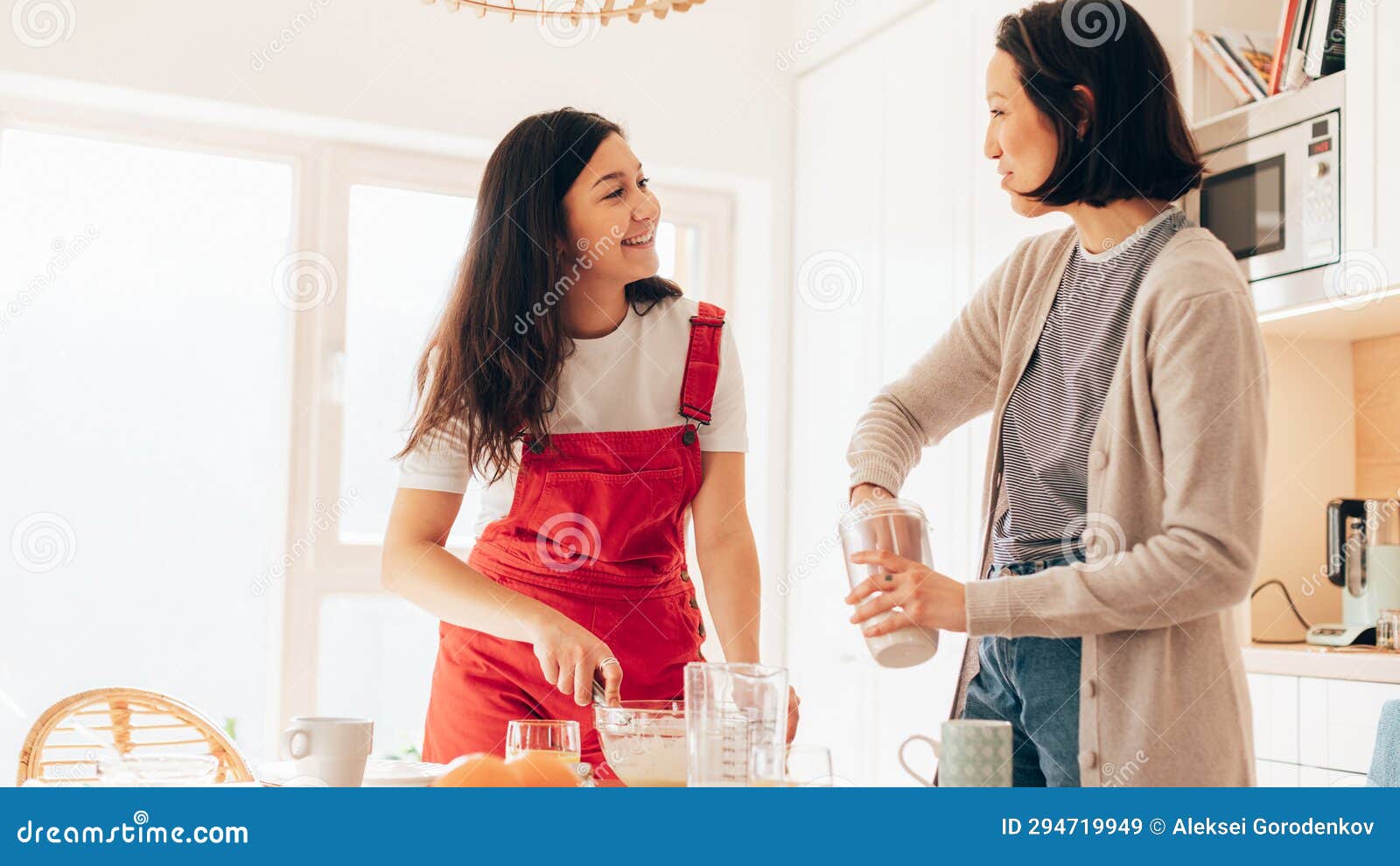 Happy Lesbian Couple Cooking Together In The Kitchen Lovely Two Girls