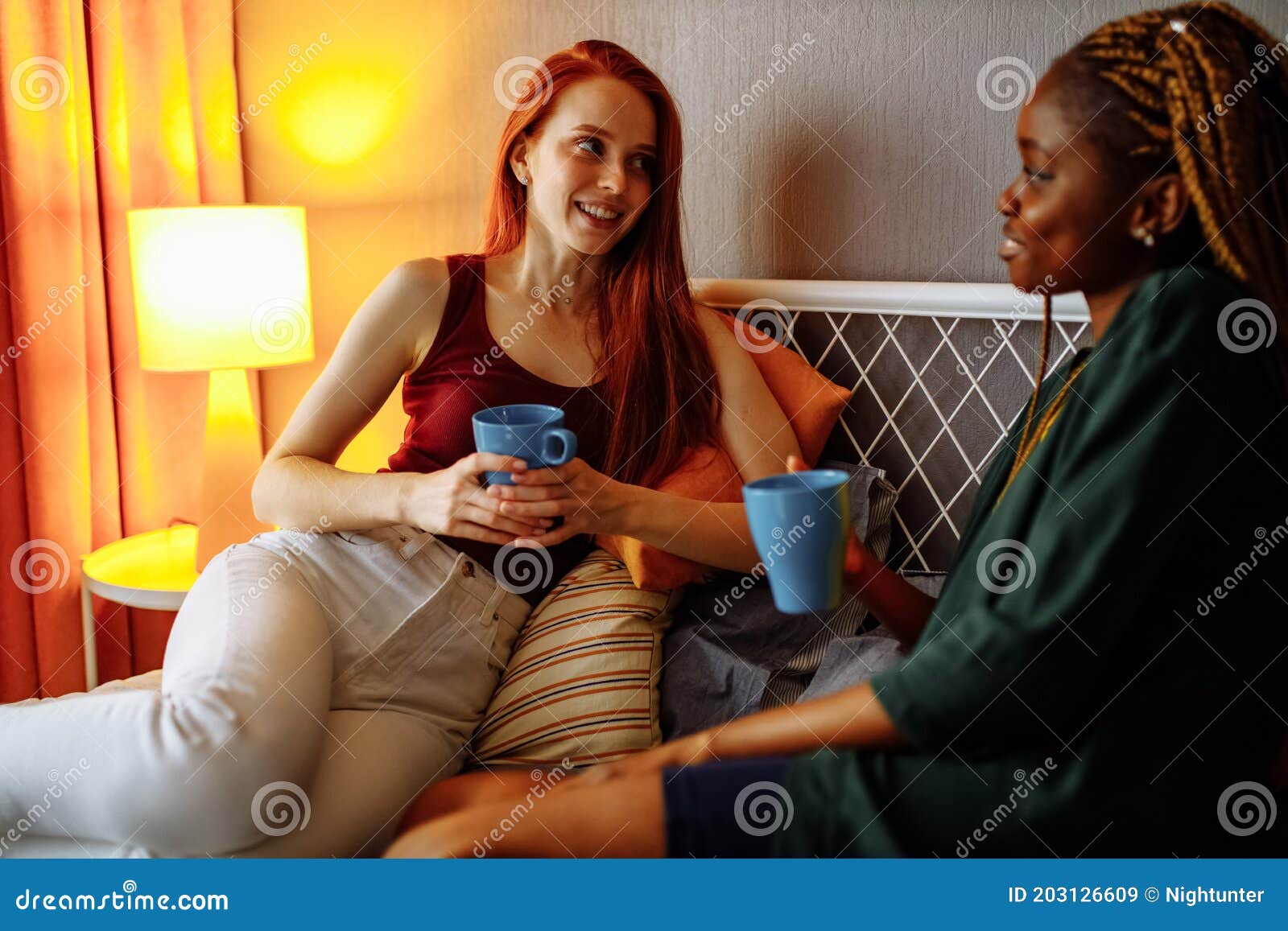 Happy Lesbian Couple Preparing Breakfast in the Kitchen Stock Image ...