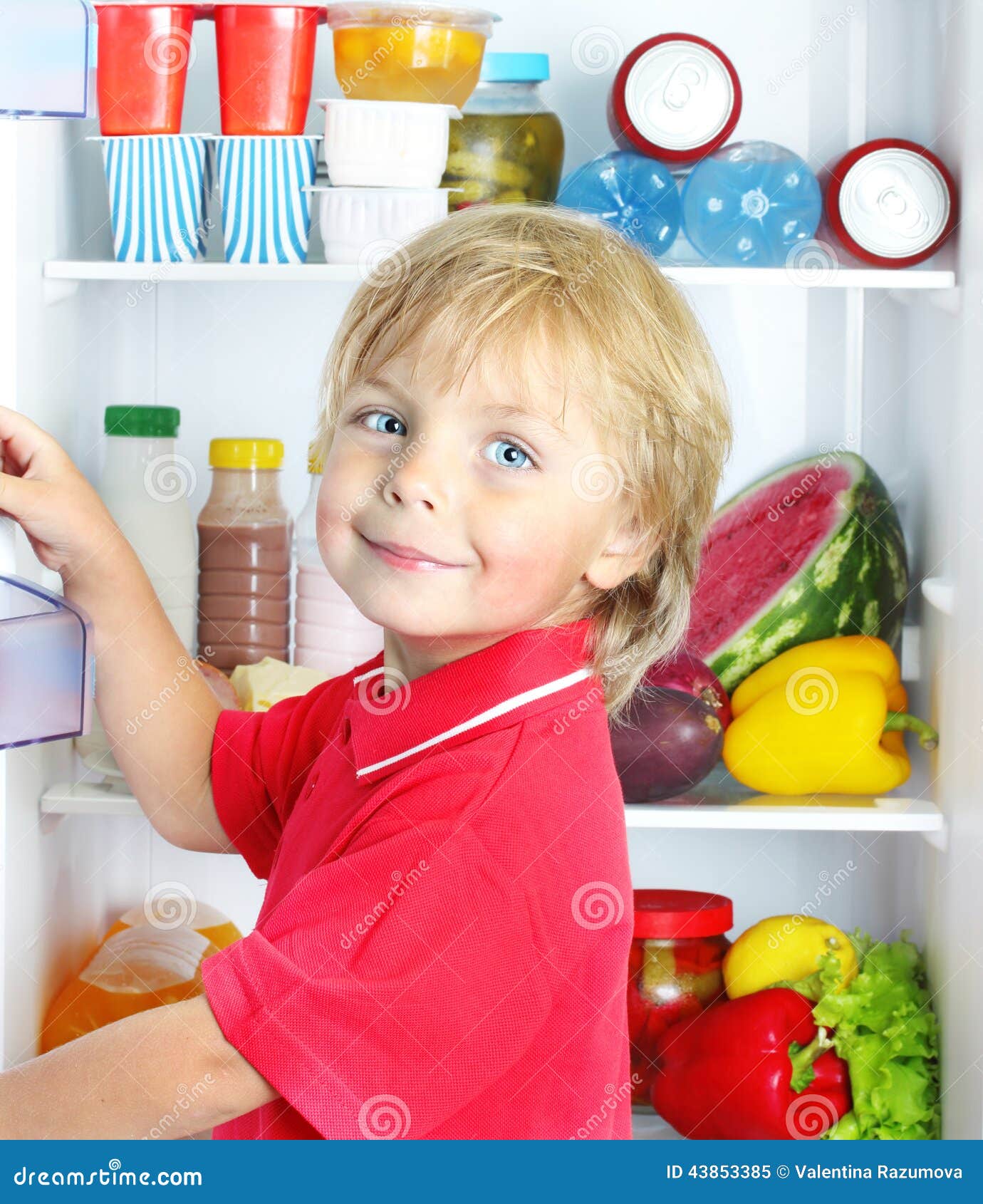 Happy little boy with food stock image. Image of expression - 43853385