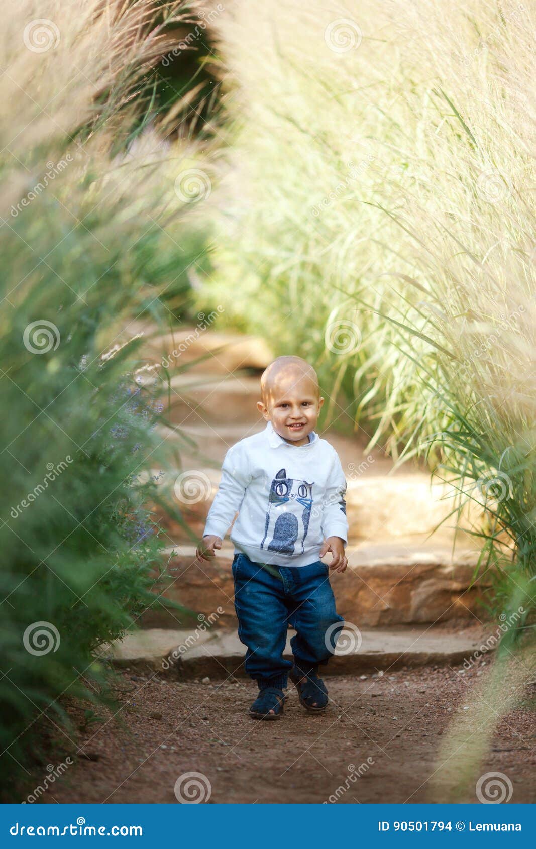 Happy little boy outside stock photo. Image of happy - 90501794