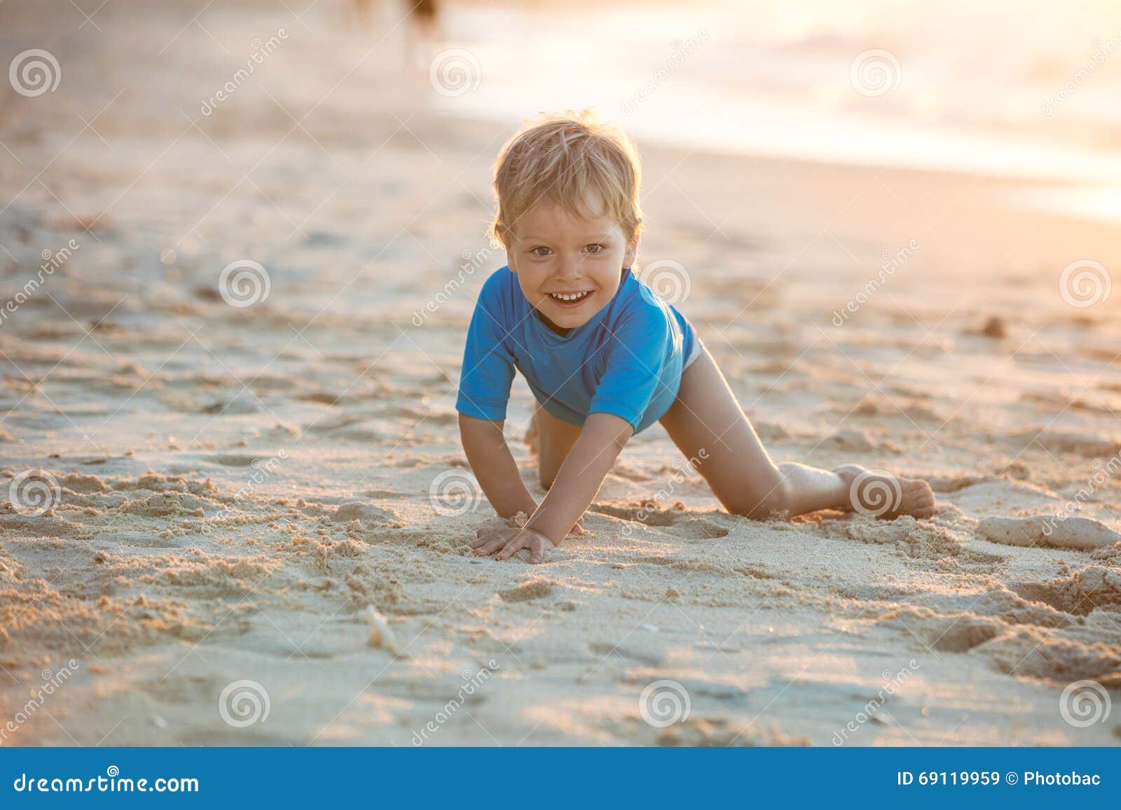 Happy Little Boy Playing on Beach. Stock Image - Image of crawling ...